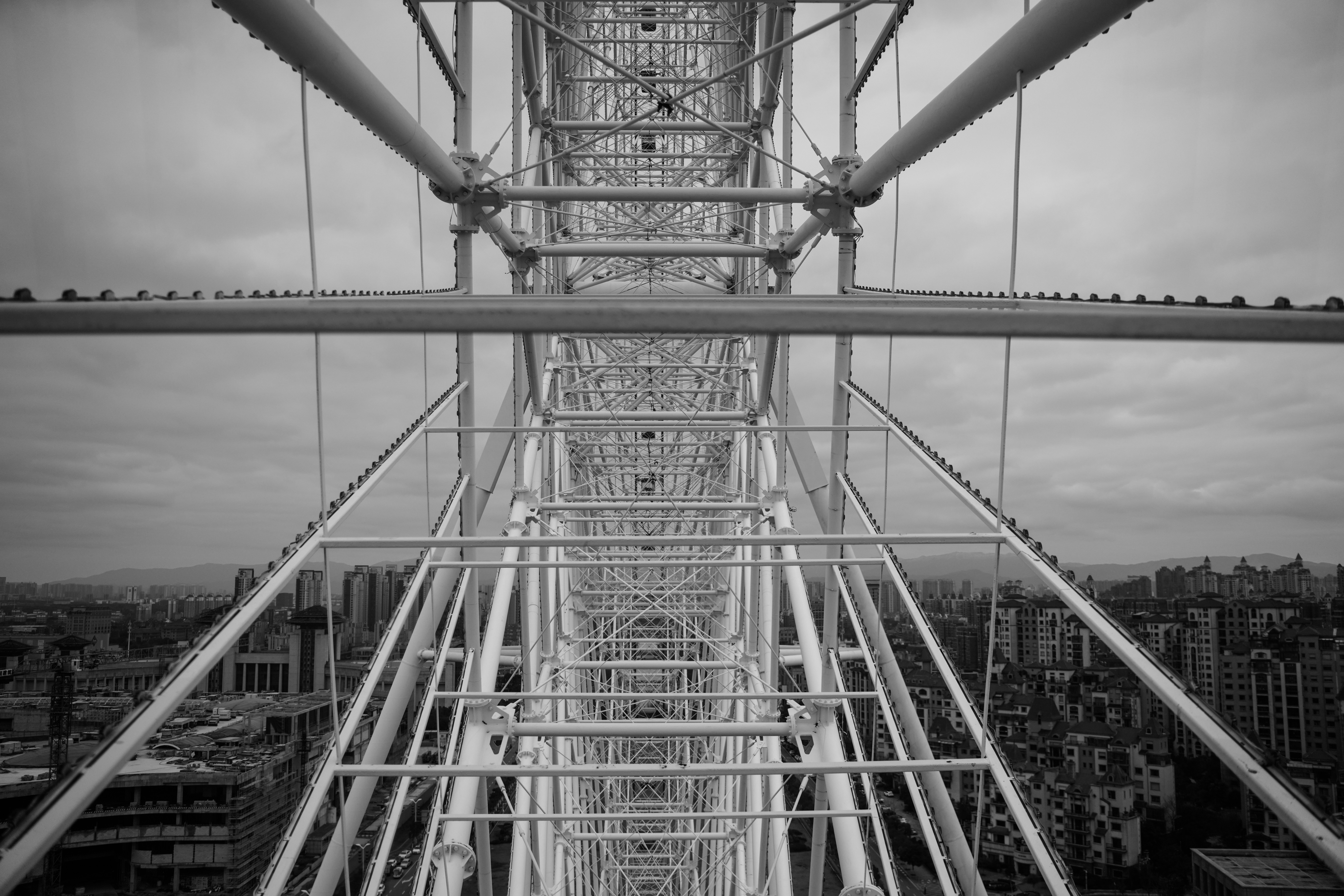 A very tall metal structure with lots of pipes photo – Free Building ...
