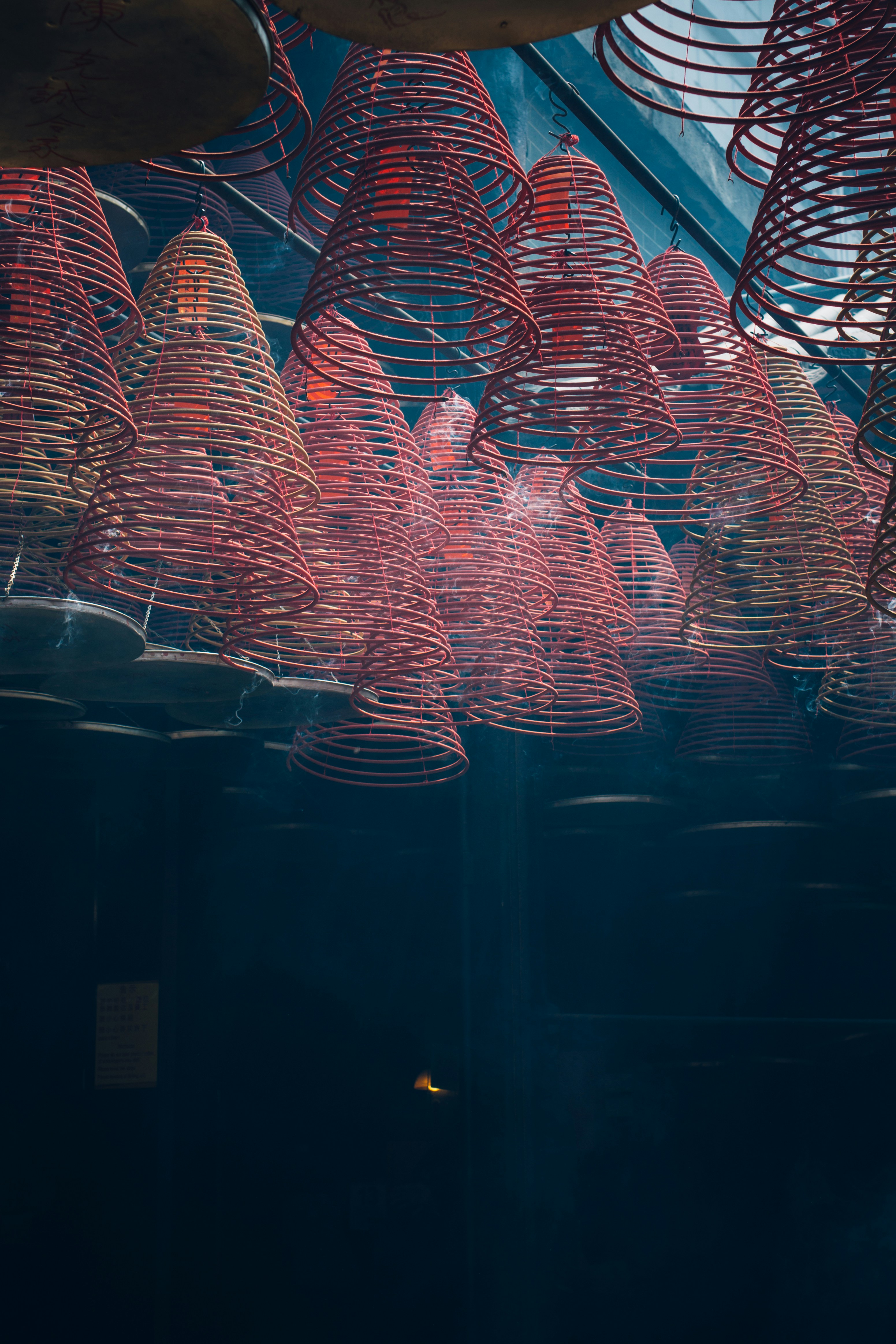 A bunch of cages hanging from the ceiling photo – Free Blue Image on ...