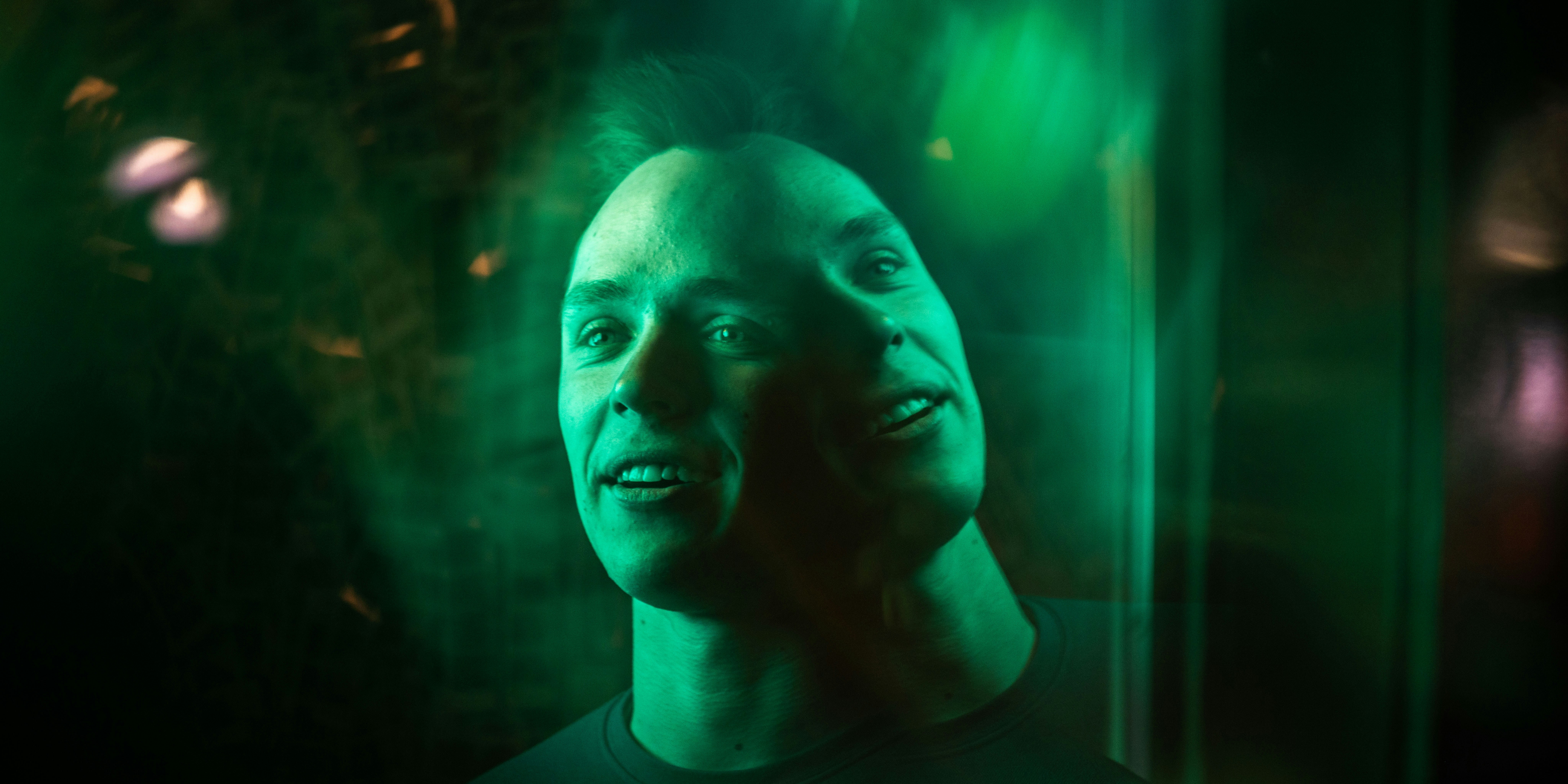 Neon Doppelgänger: Portrait Behind a Glass Portal