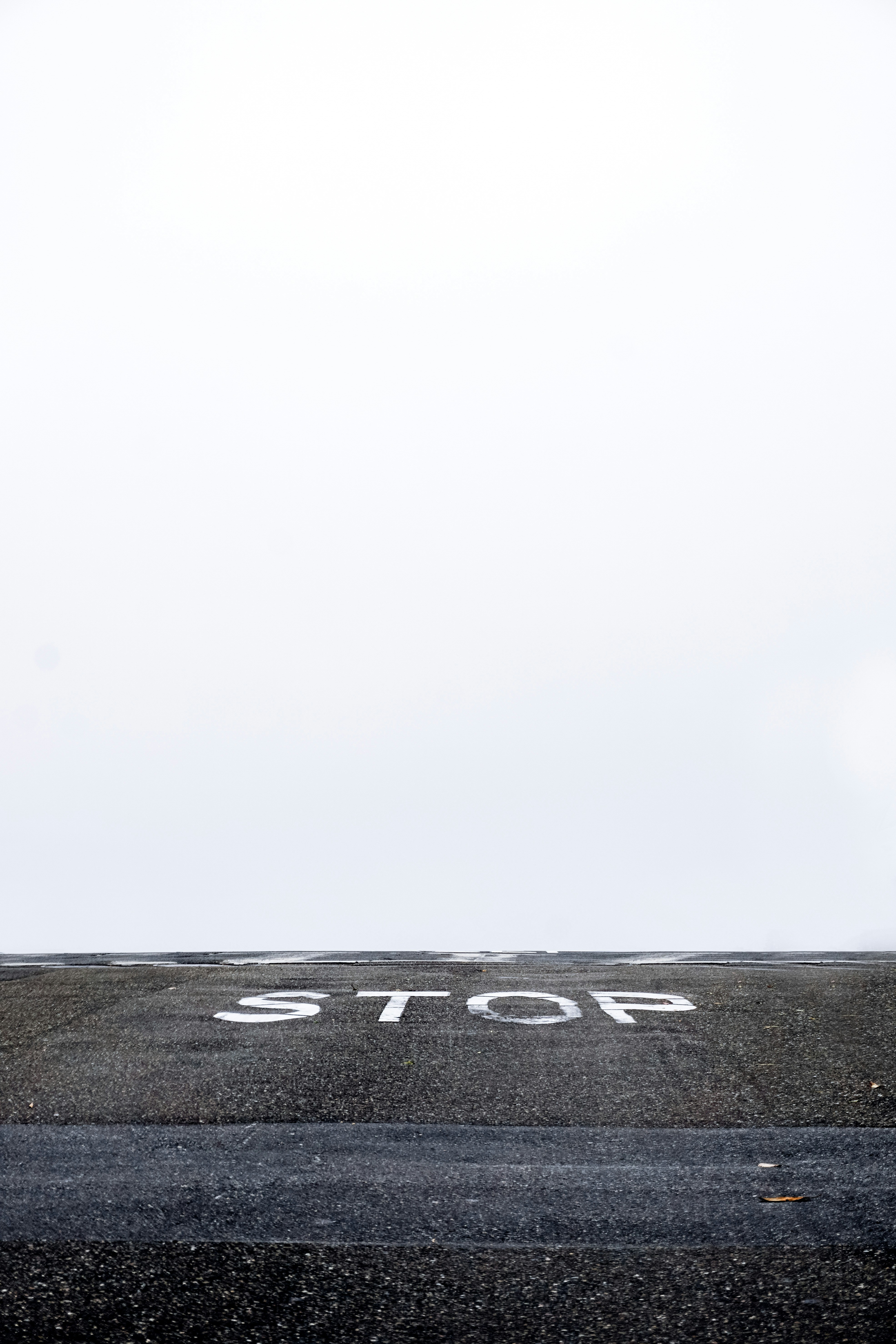 Stop Sign at Horizon: A Quiet Edge of the Road