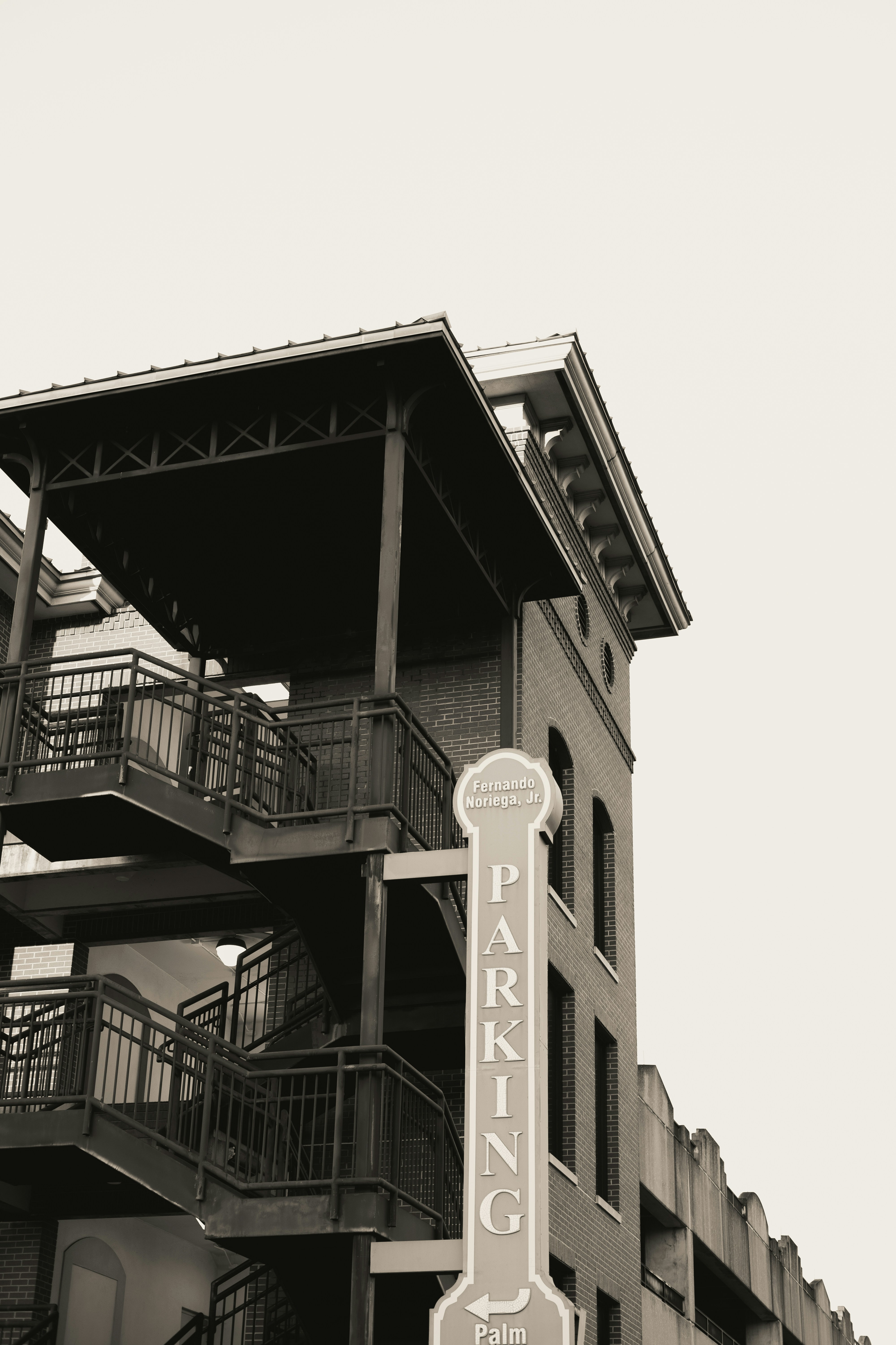Sepia Tower: The Brick Staircase and PARKING Sign