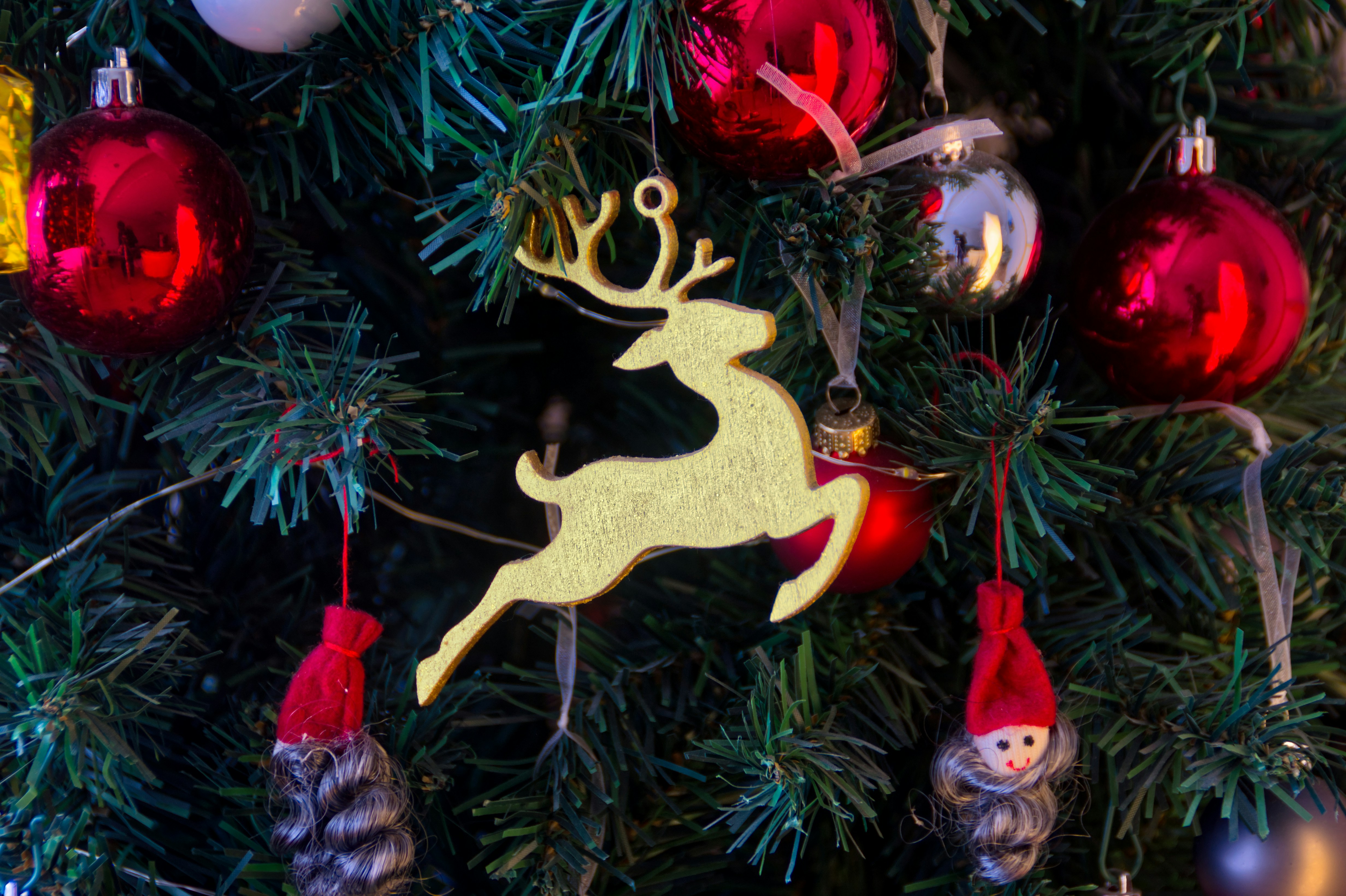 Gold Reindeer among Christmas Ornaments