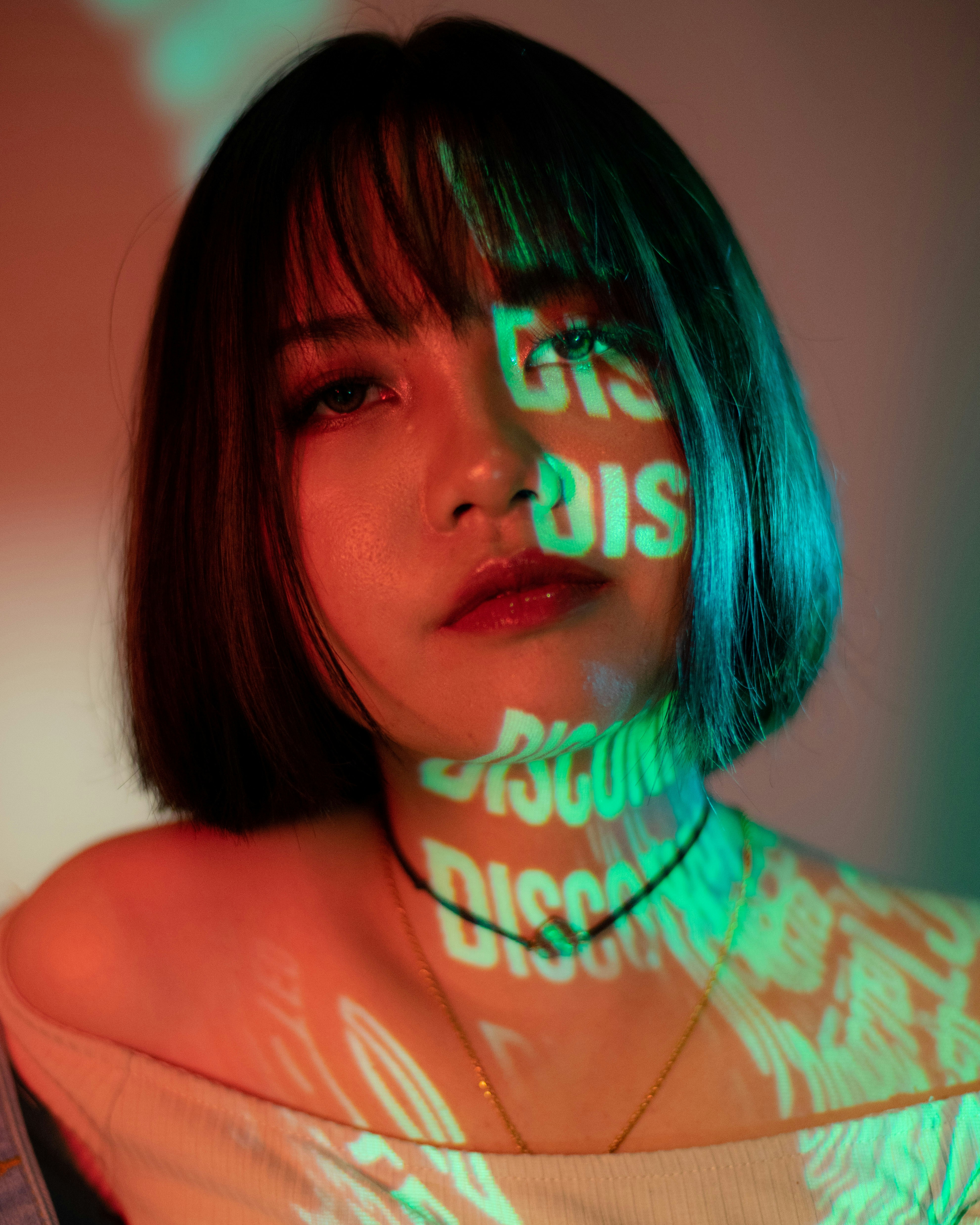 A woman with a green glow on her face photo – Free Indonesia Image on ...