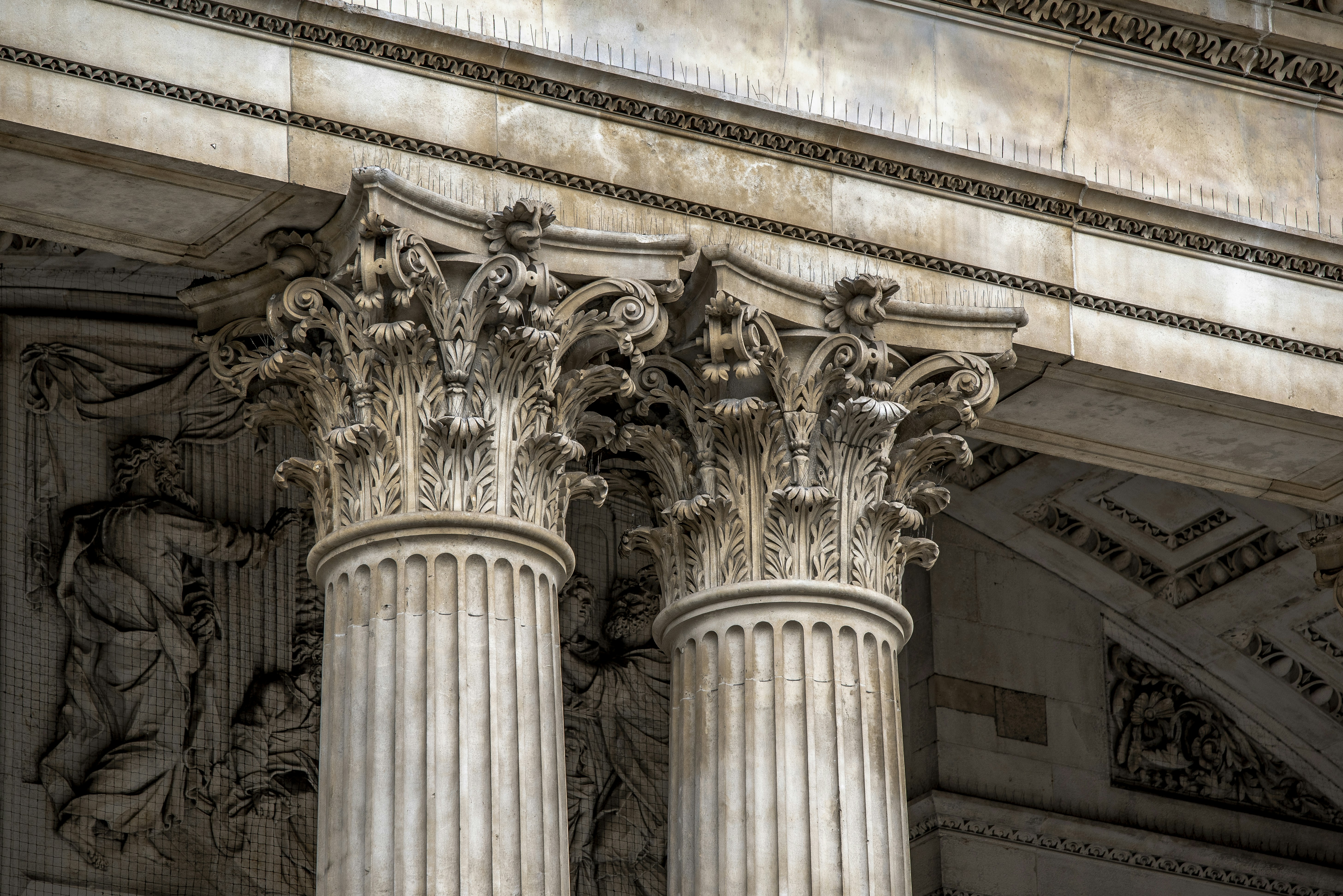 A close up of some very old looking pillars photo – Free Londra Image ...