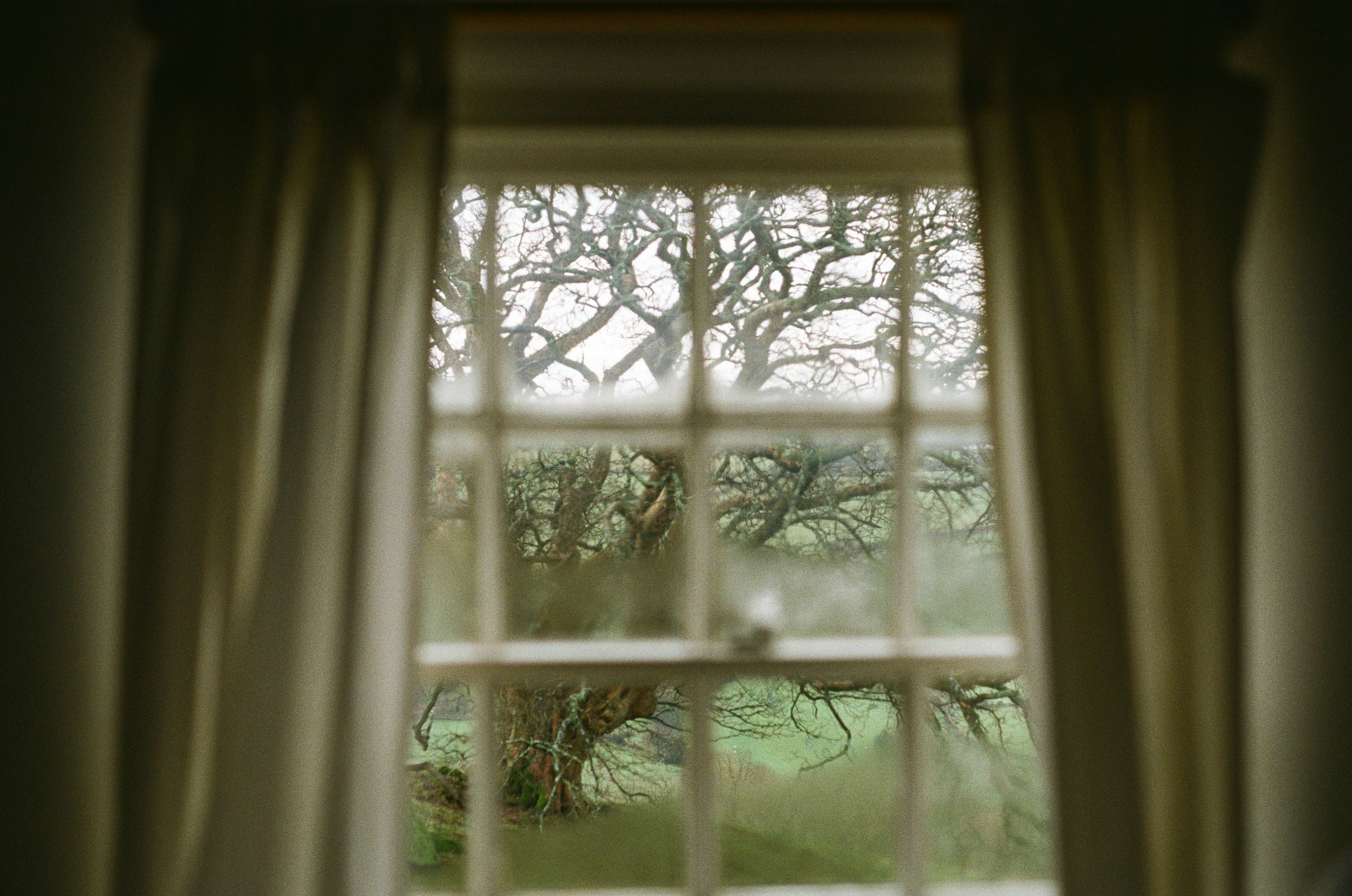A view looking out of a window photo – Free Cumbria Image on Unsplash