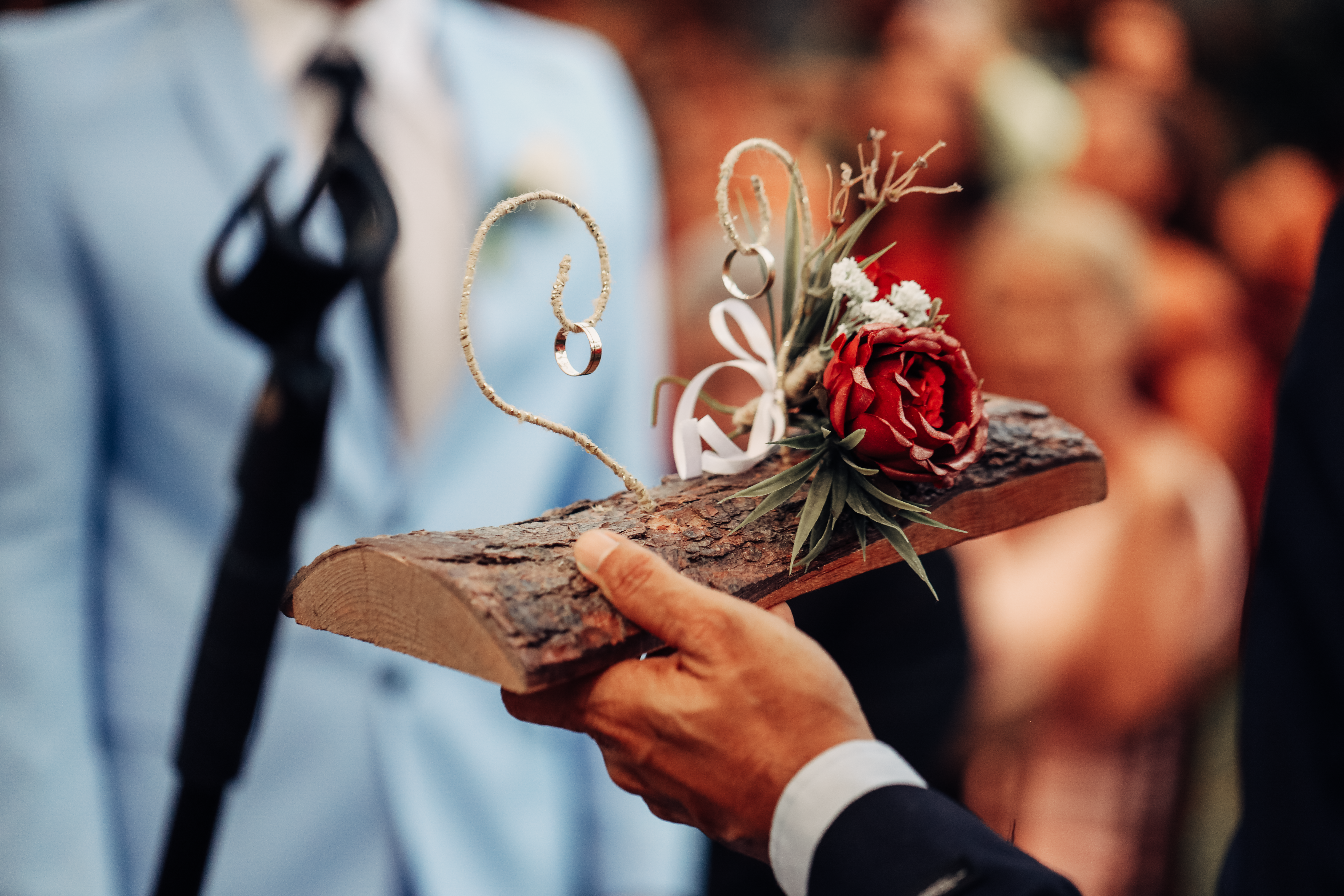 Floral Keepsake on Weathered Wood During a Wedding Moment