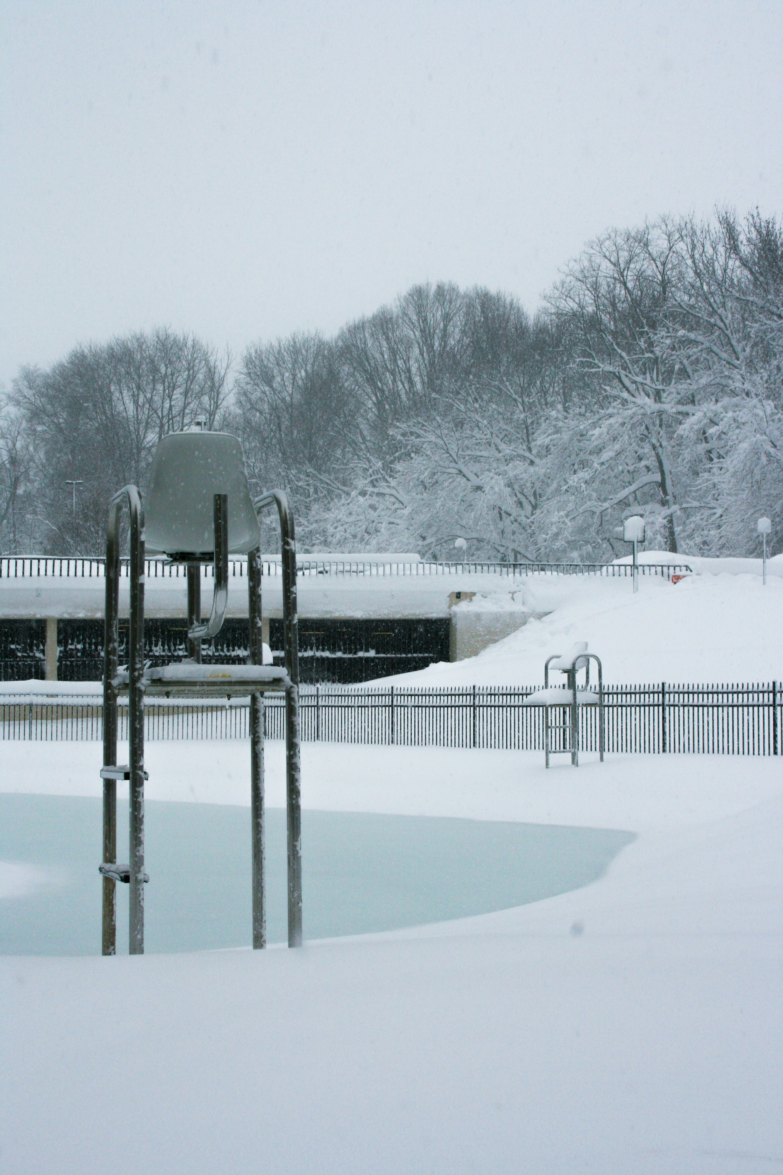 Snowbound Poolside Beacon in a Quiet Winter Scene