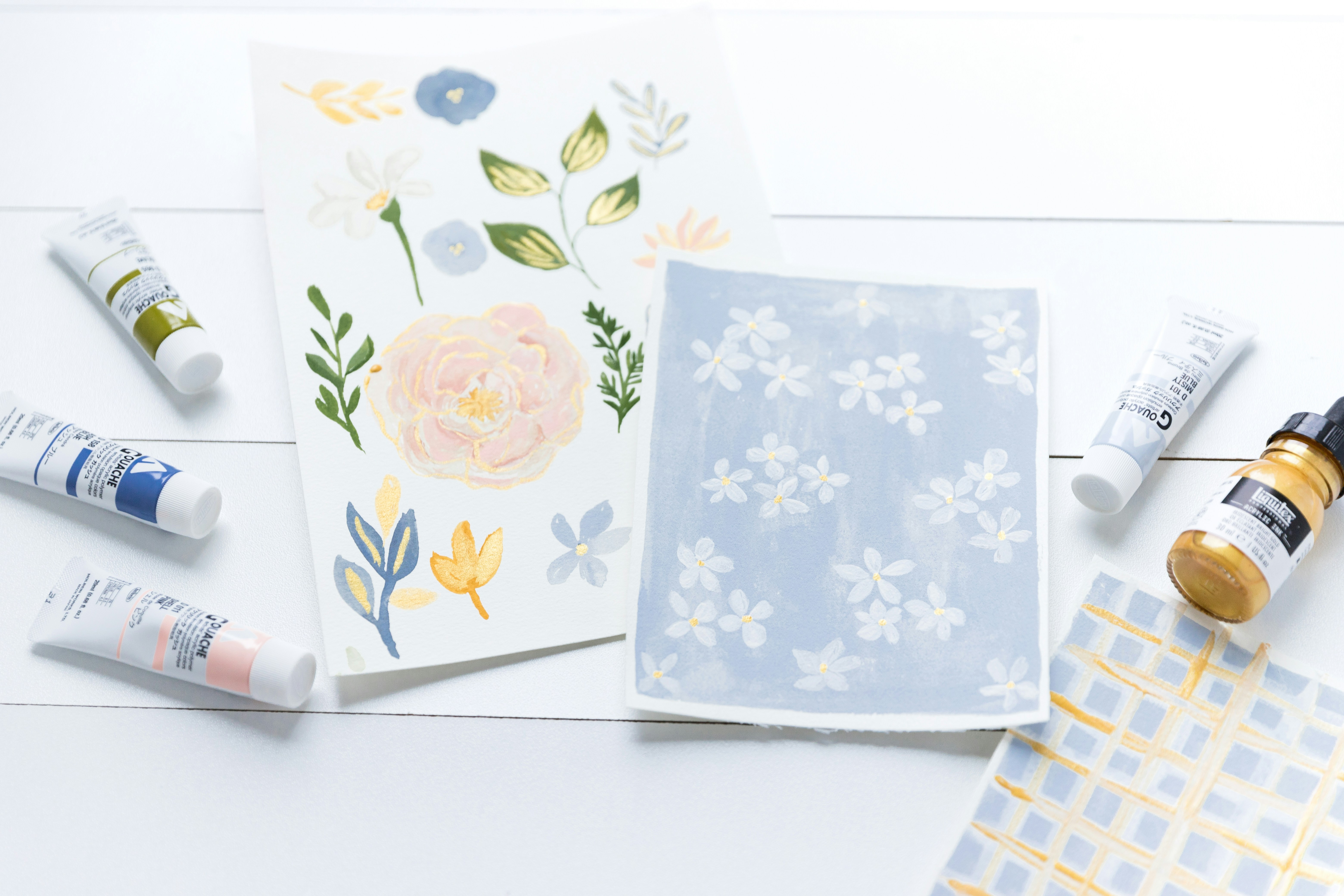 A table topped with different types of art supplies photo – Free Gold ...