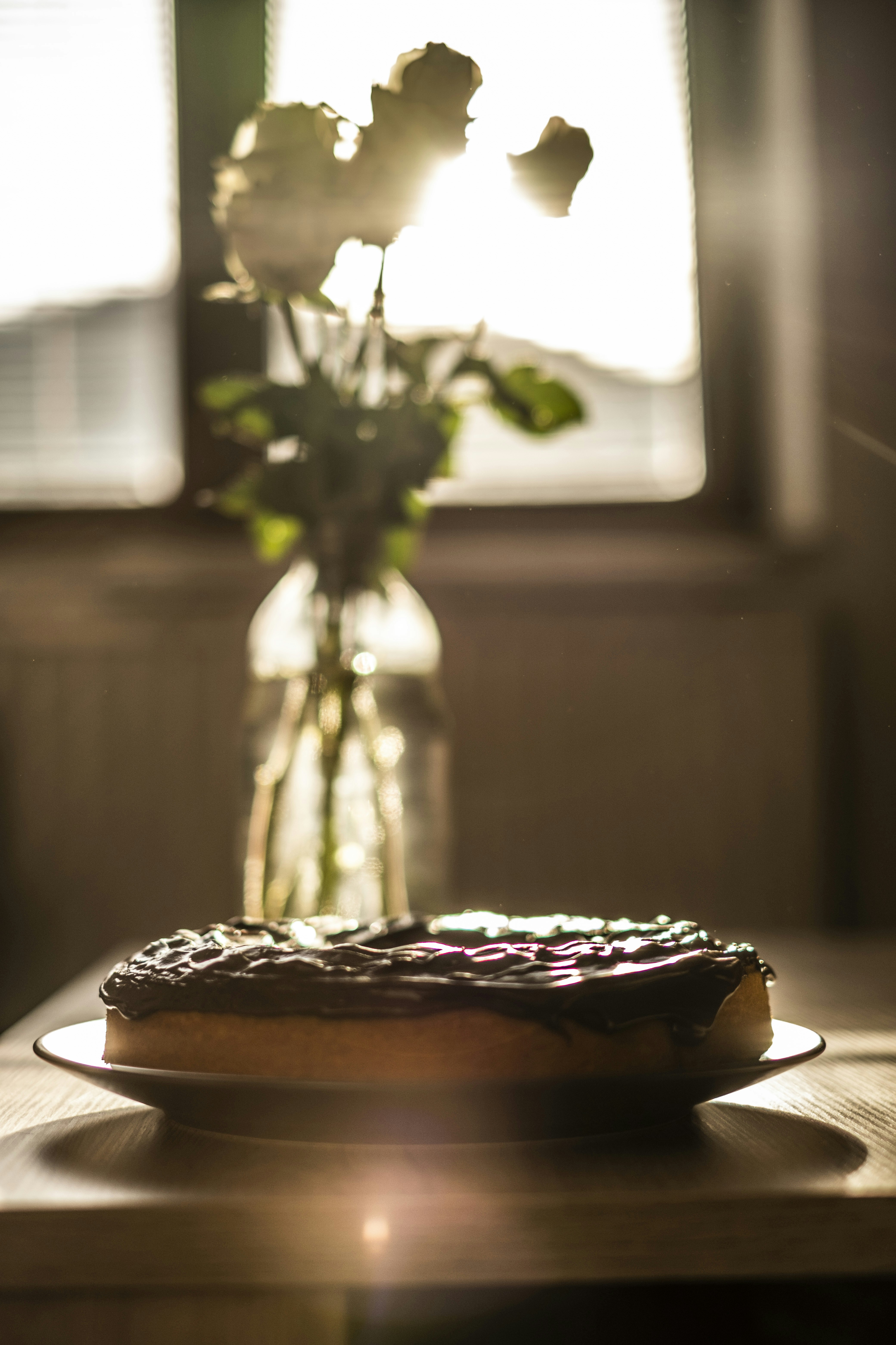 Sunlit Rose Cakes and Glass Vase: A Quiet Morning Still Life