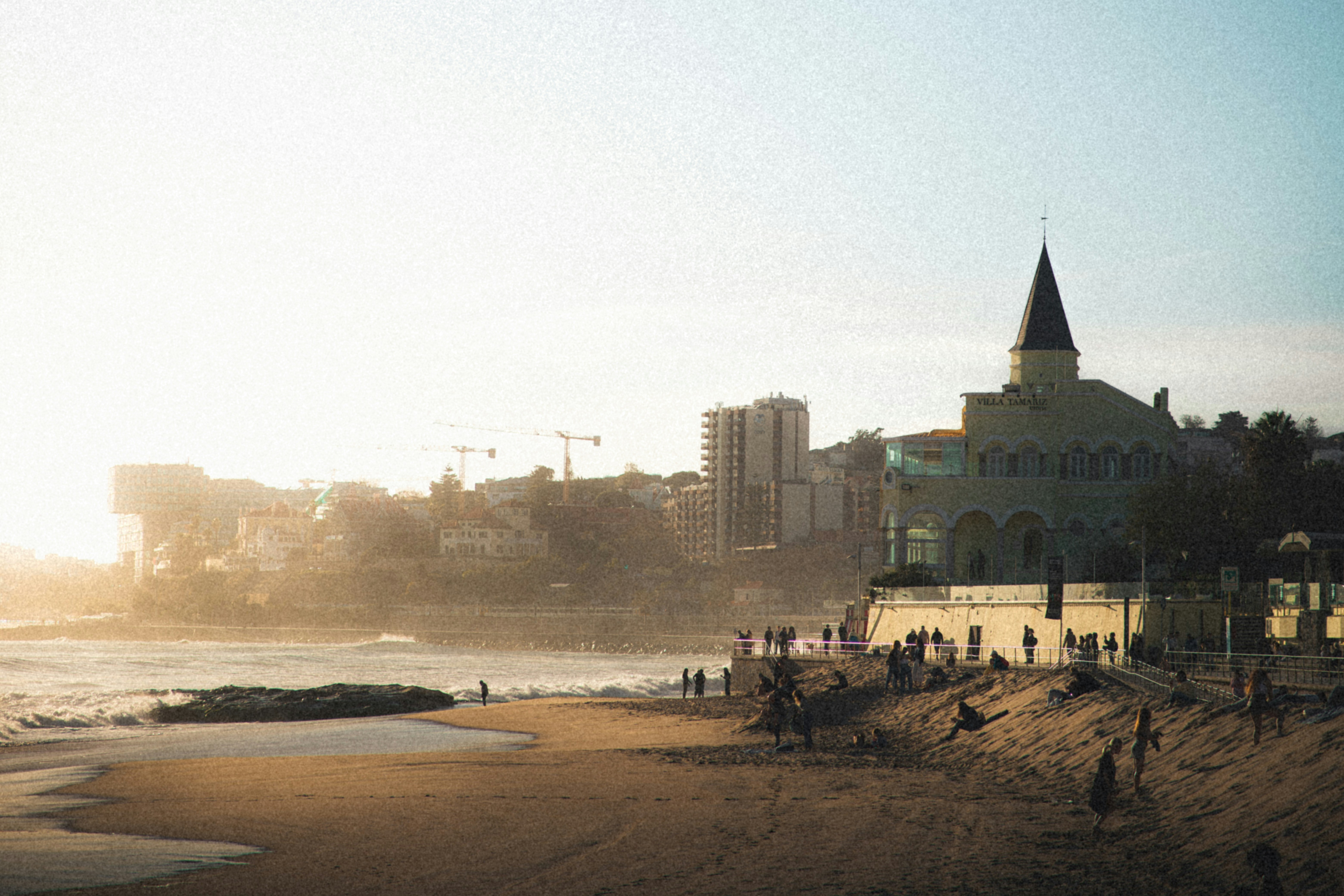 Dusk at the Seafront: The Towered Building guardess the Shore