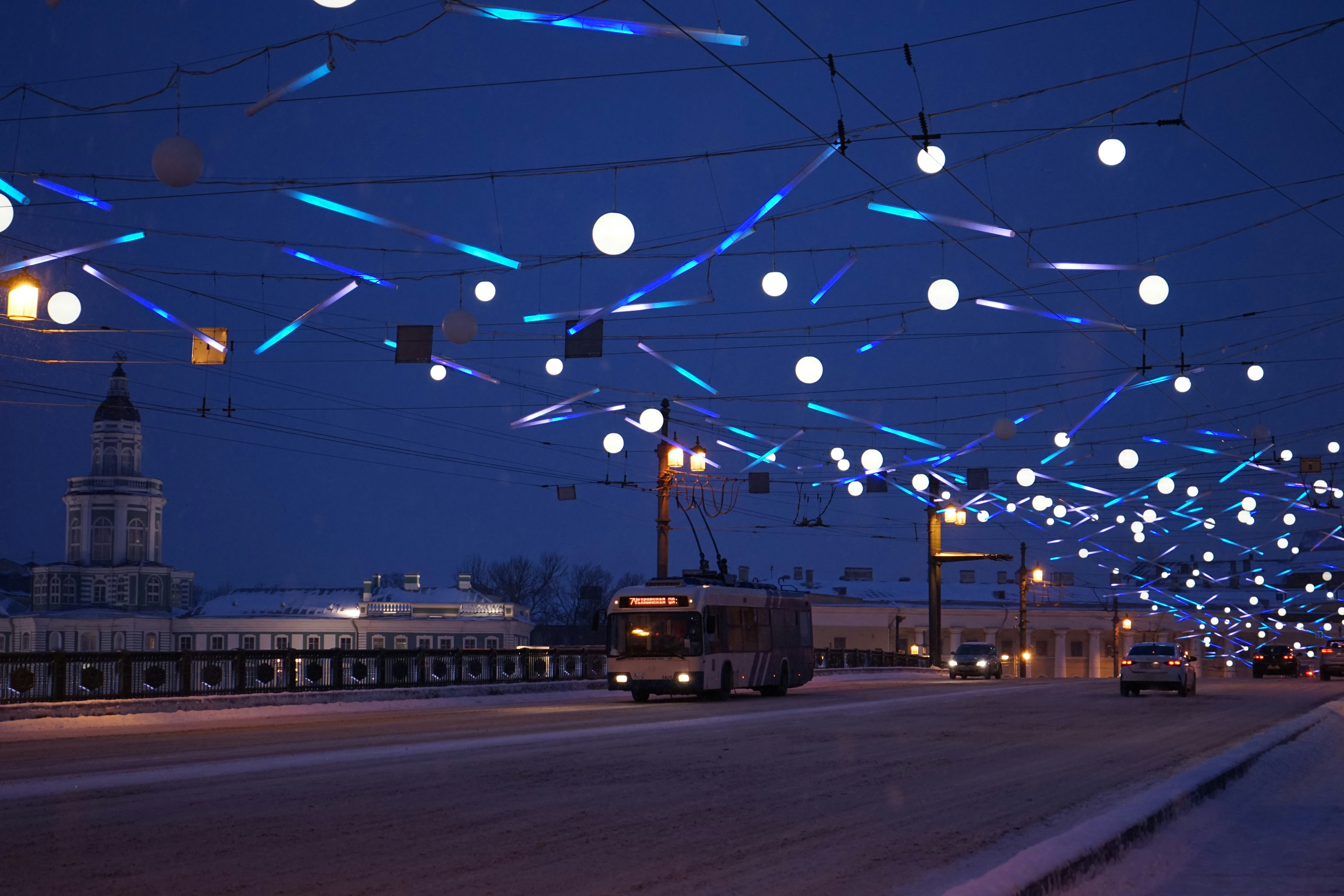 A city street filled with lots of blue lights photo – Free Night Image ...