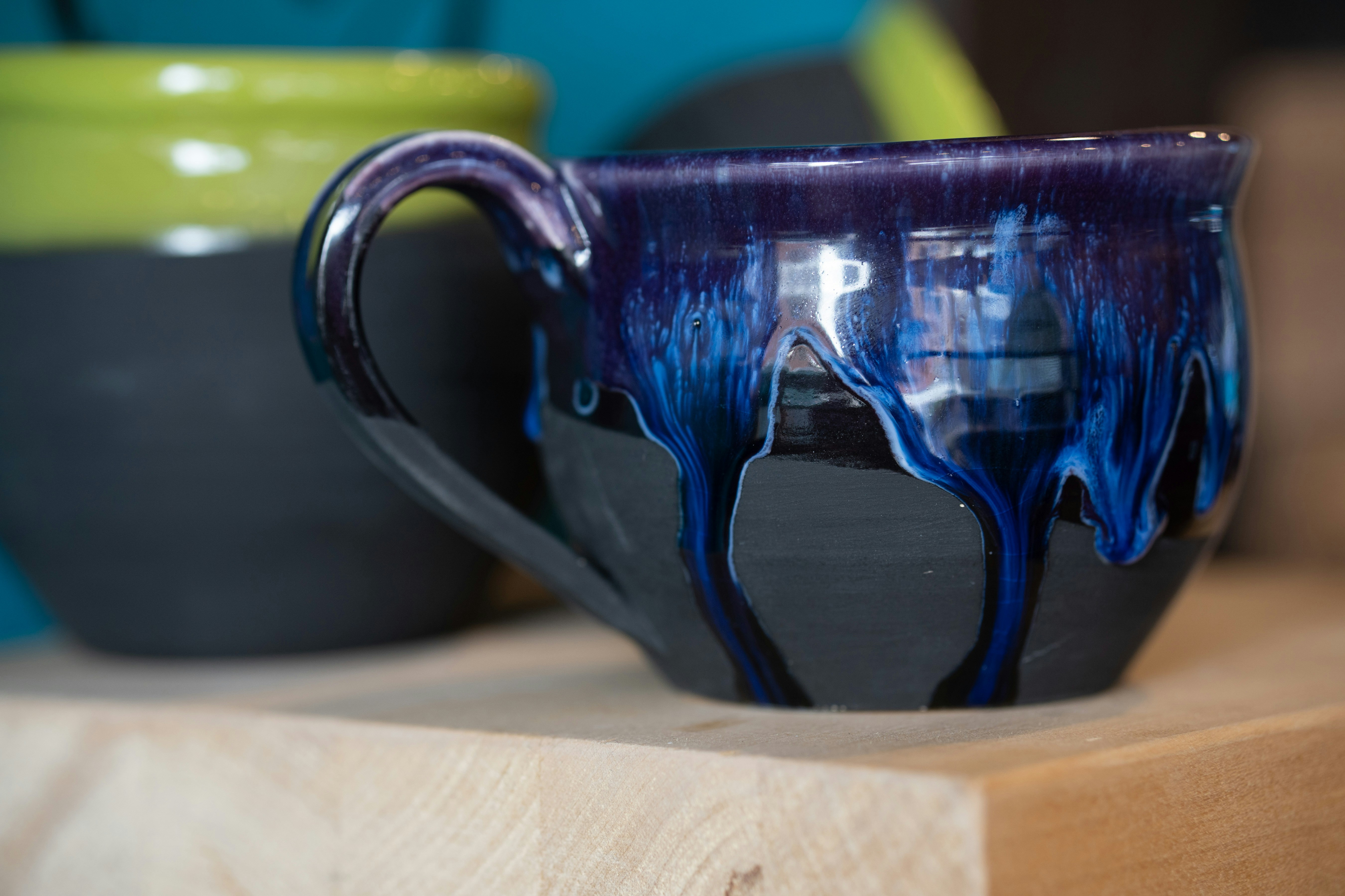 Indigo Drip Mug on a Quiet Wooden Stage