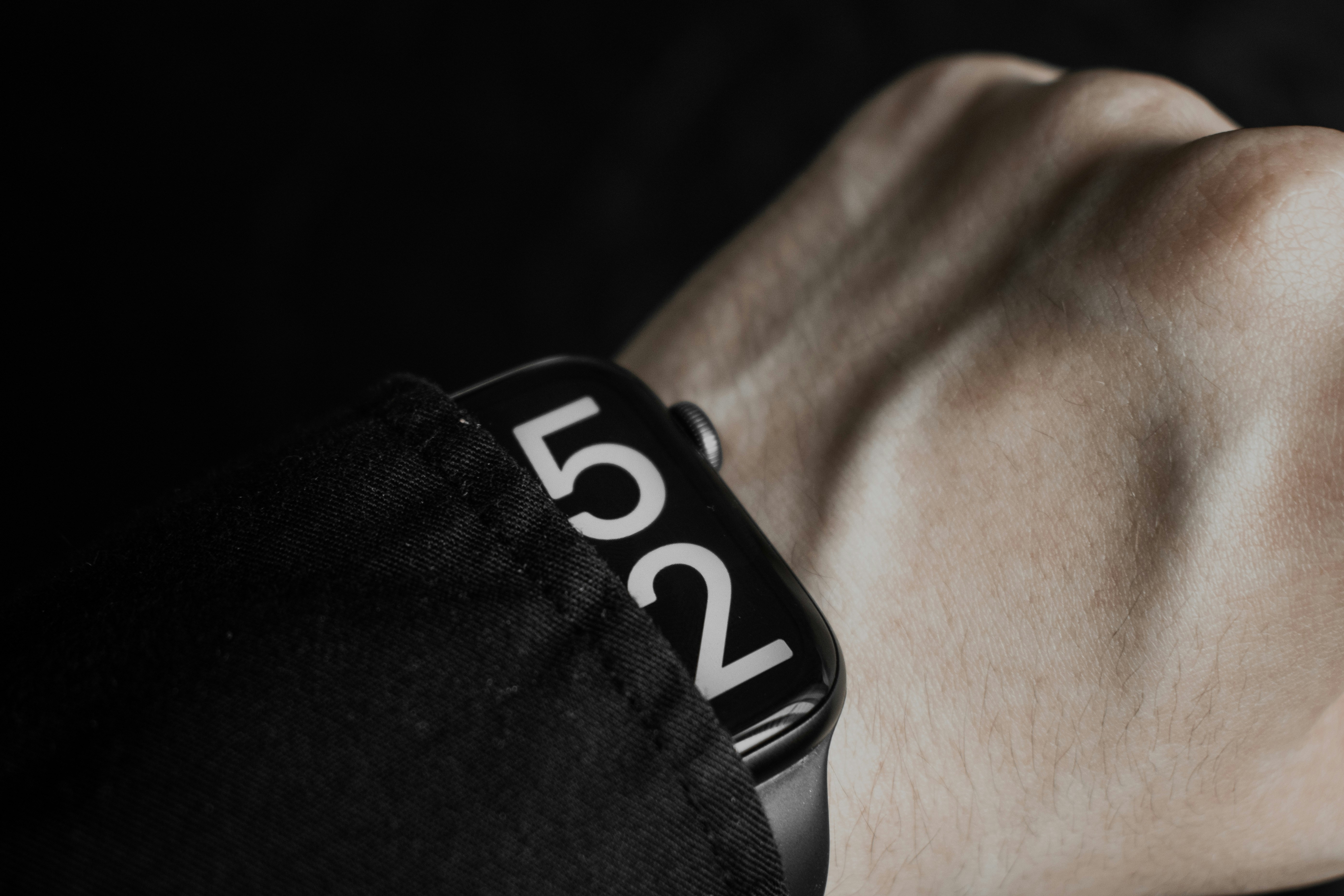 A close up of a person's wrist with a watch on it photo – Free Grey ...