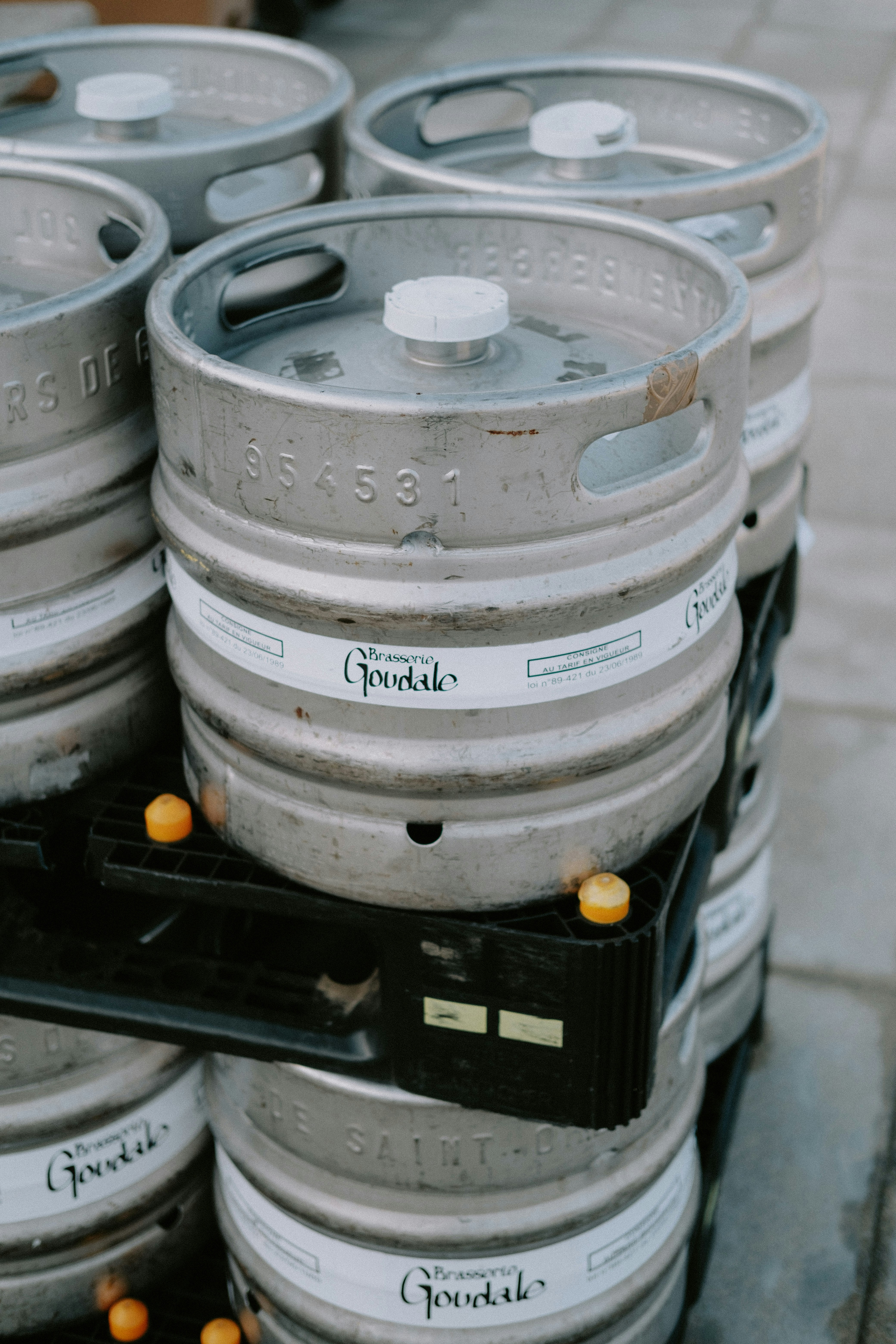 A stack of kegs sitting on top of each other photo – Free Grey Image on ...