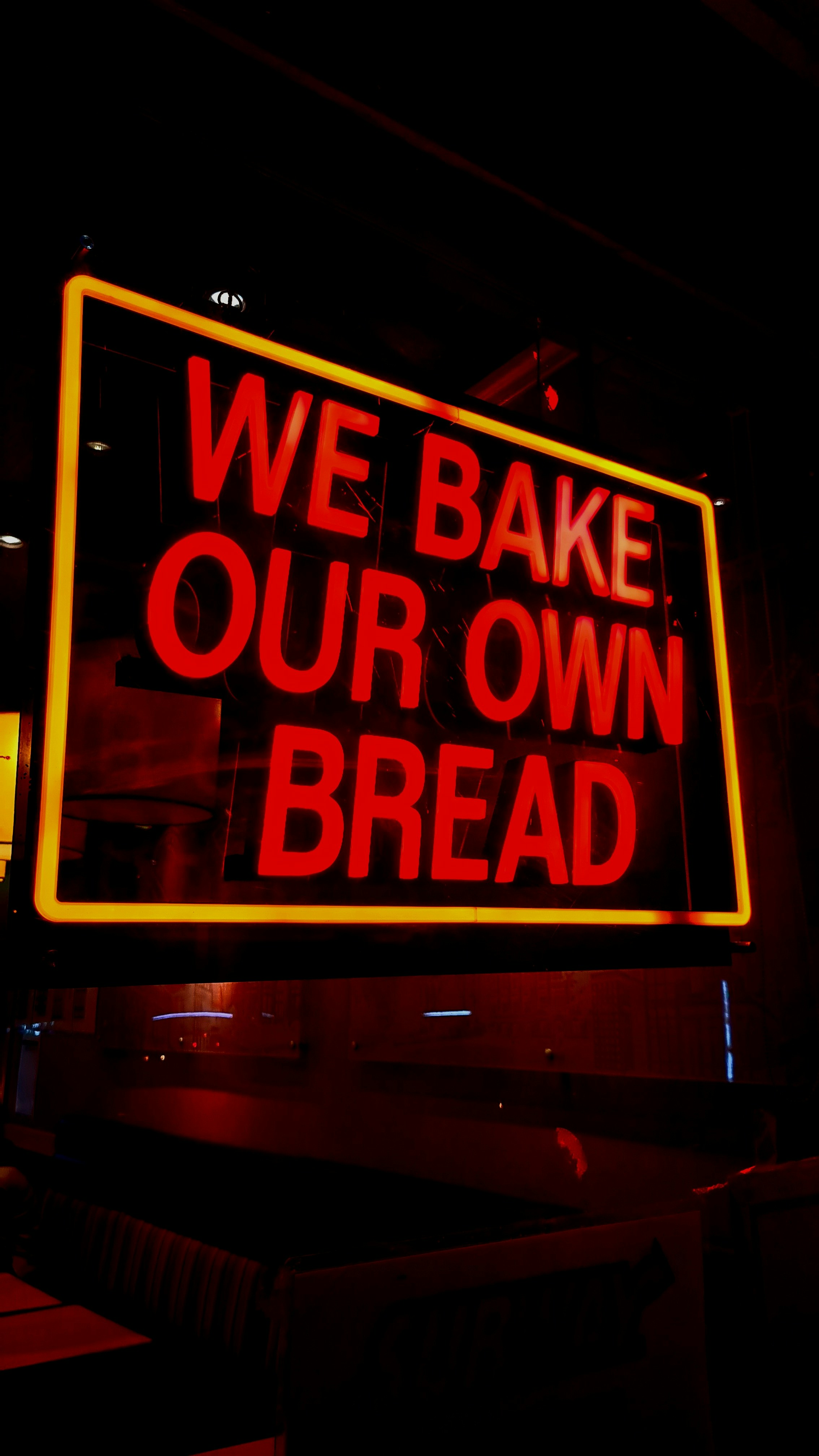 Neon Bread Sign: A Moody Night Shot