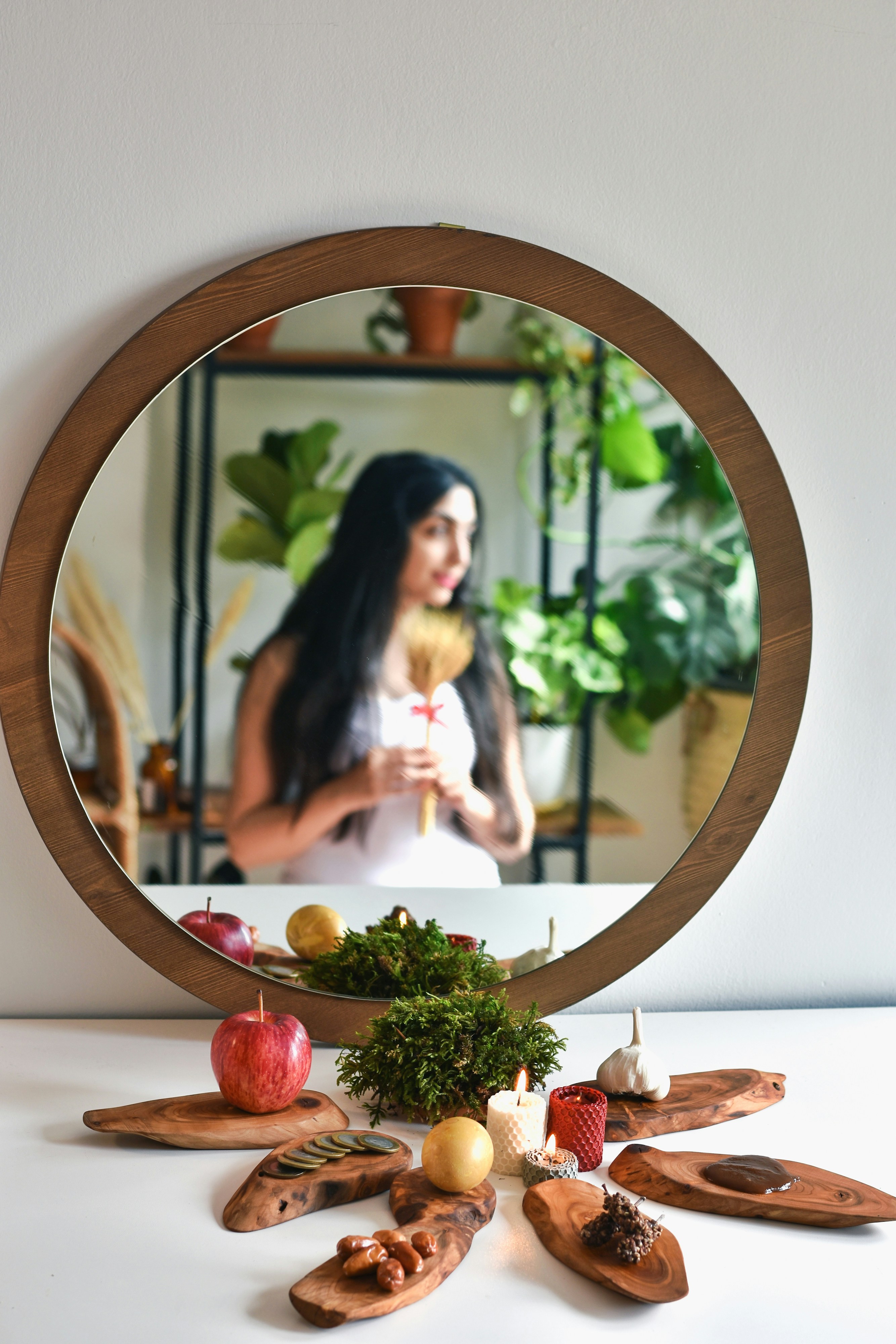 Round Mirror Portrait: A Quiet Still Life Framing a Hidden Face