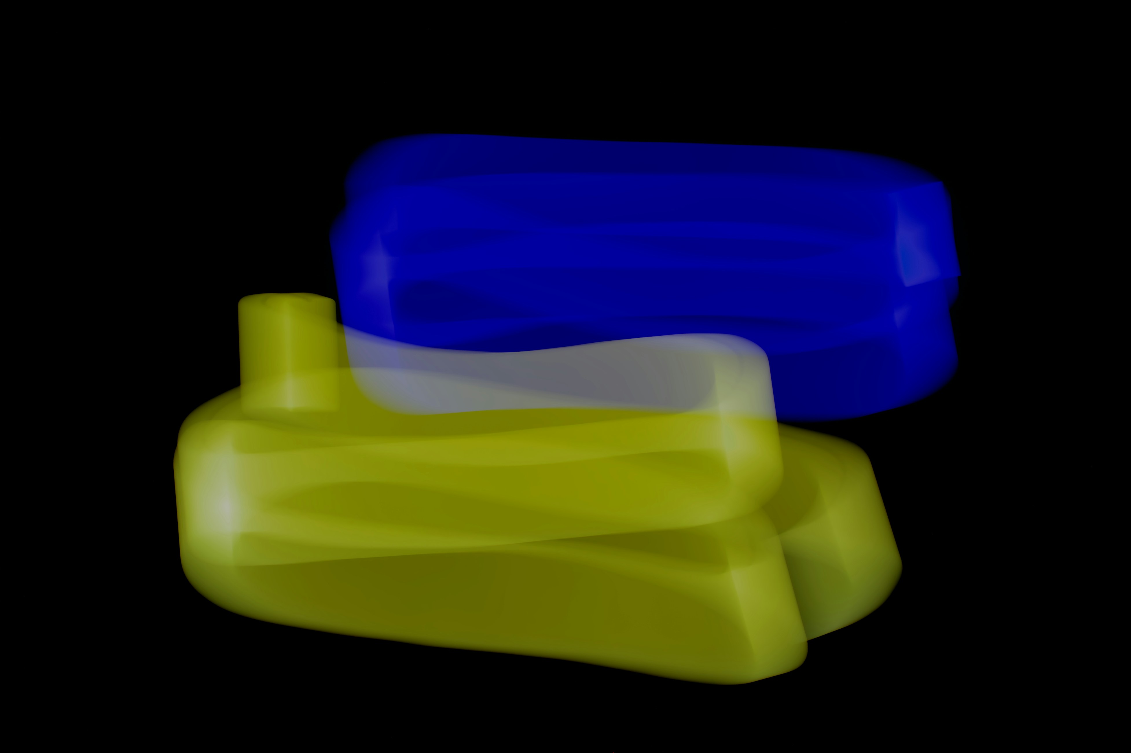 Color-Drift Duo: Yellow Foreground with a Blue Backdrop in Motion Blur