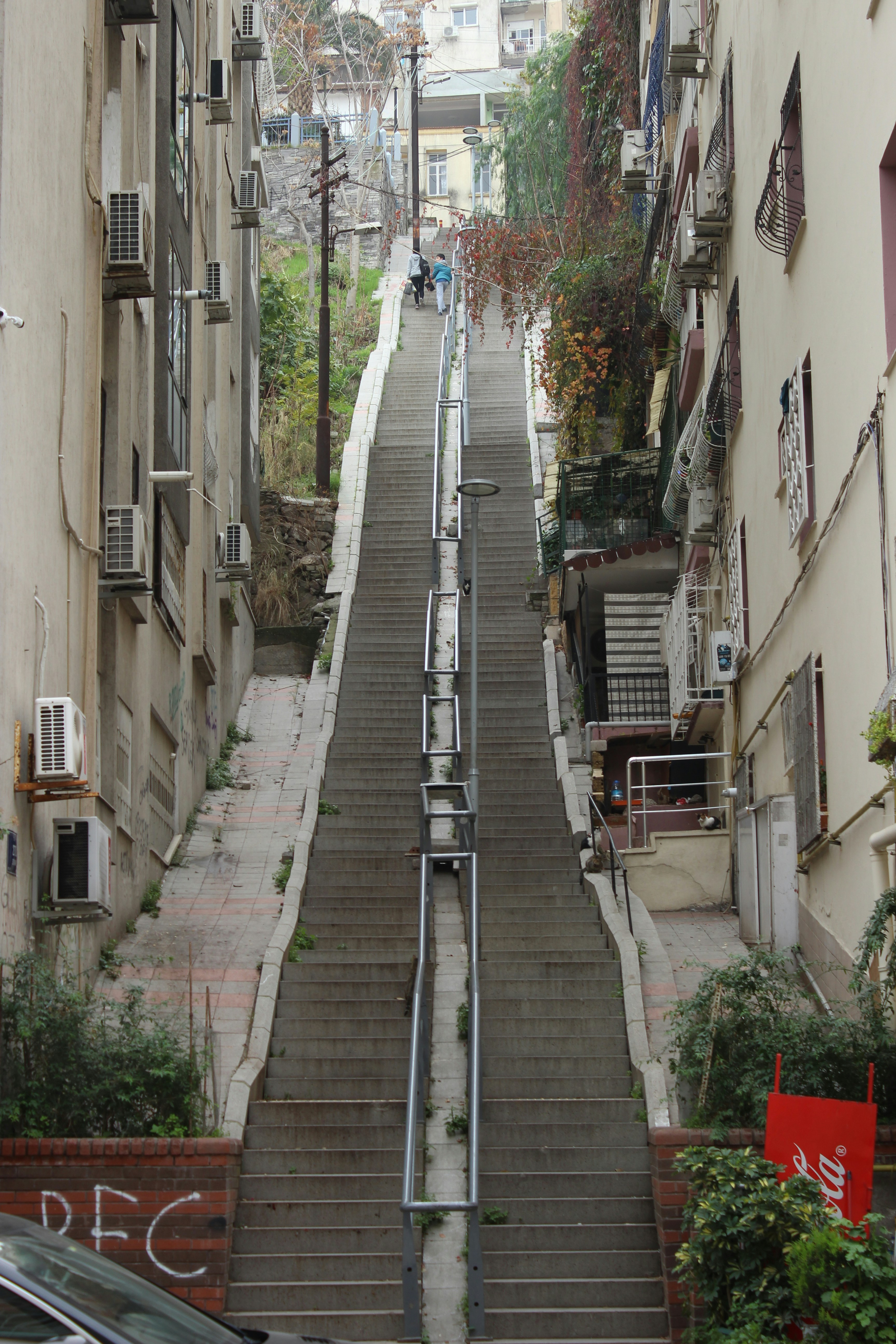 A set of stairs leading up to the top of a building photo – Free Grey ...