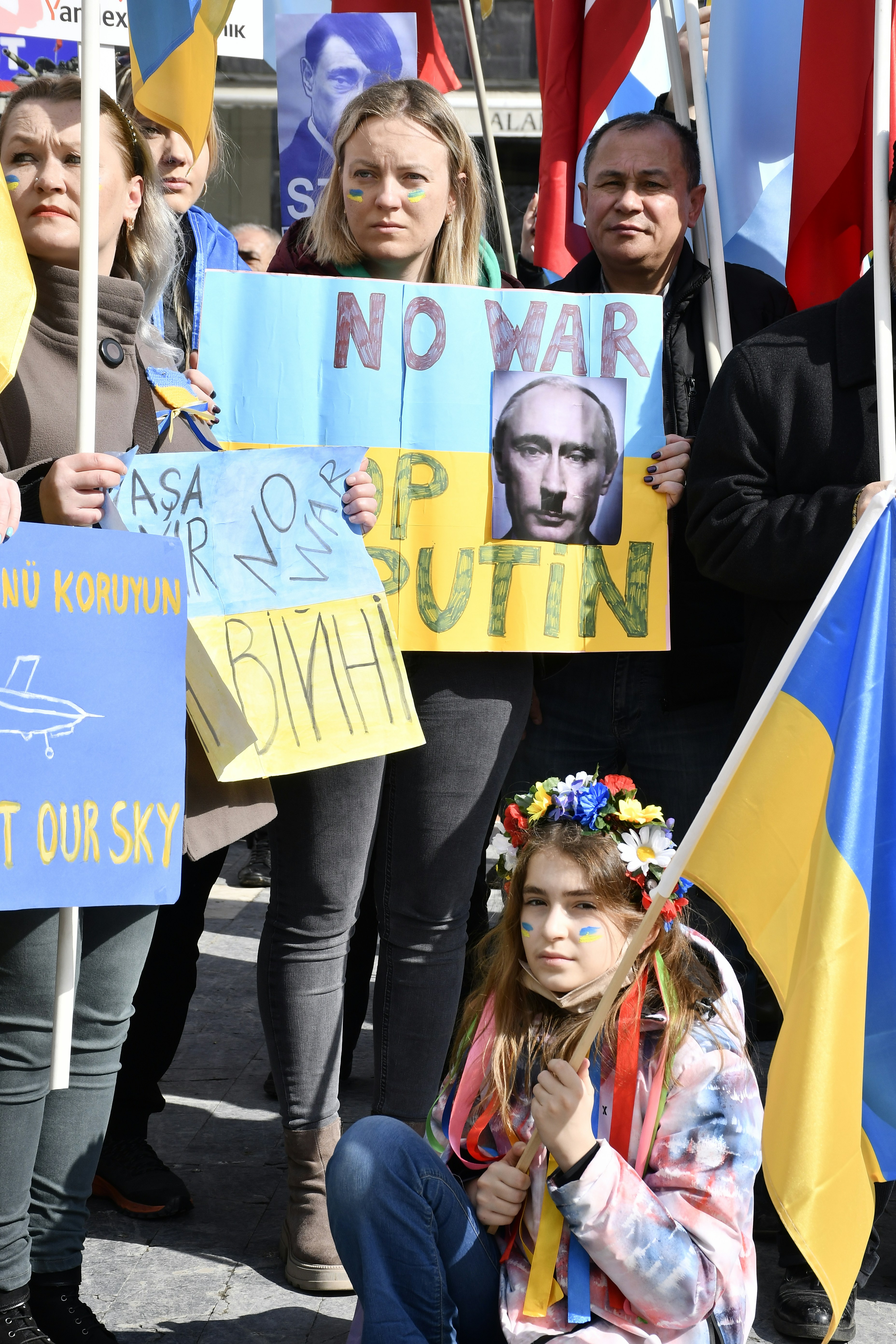 No War Sign: Portrait Framed by Flags at a Ukrainian Rally