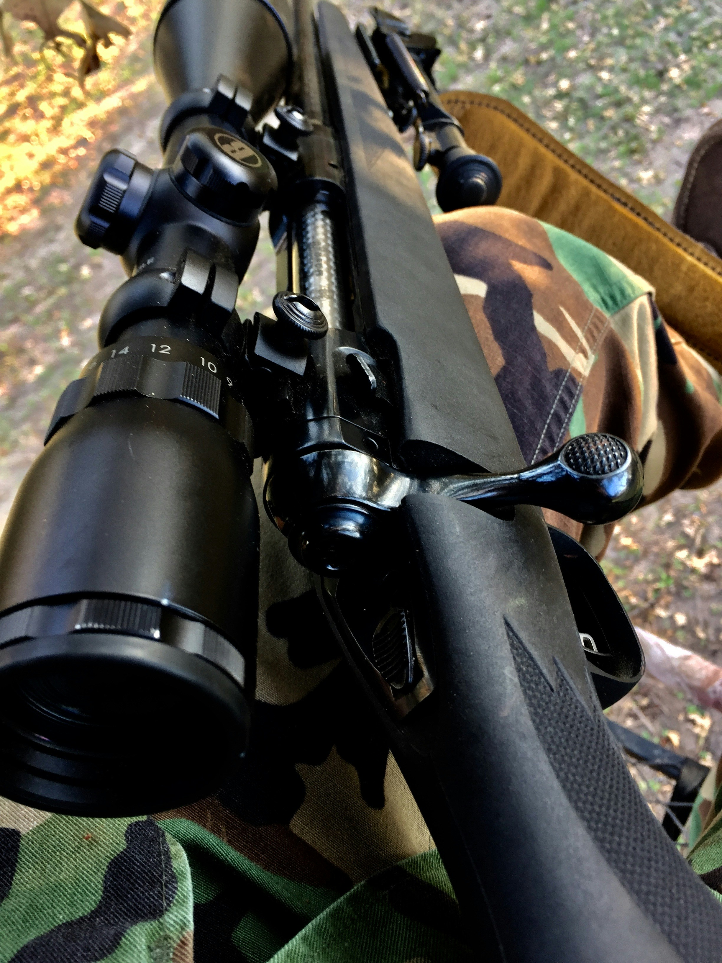 A close up of a rifle with a scope photo – Free Transportation Image on ...