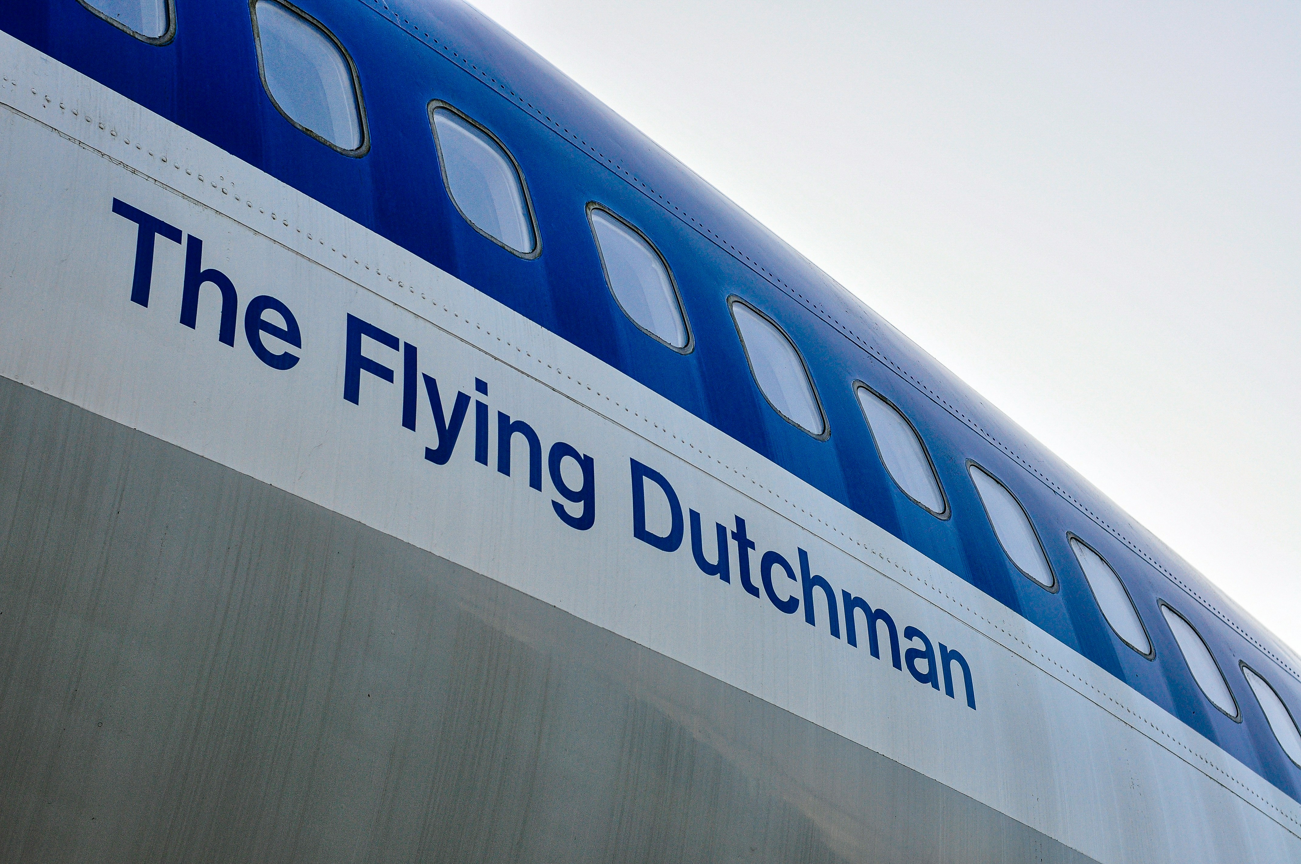 The flying dutchman logo on the side of a plane photo – Free Airplane ...