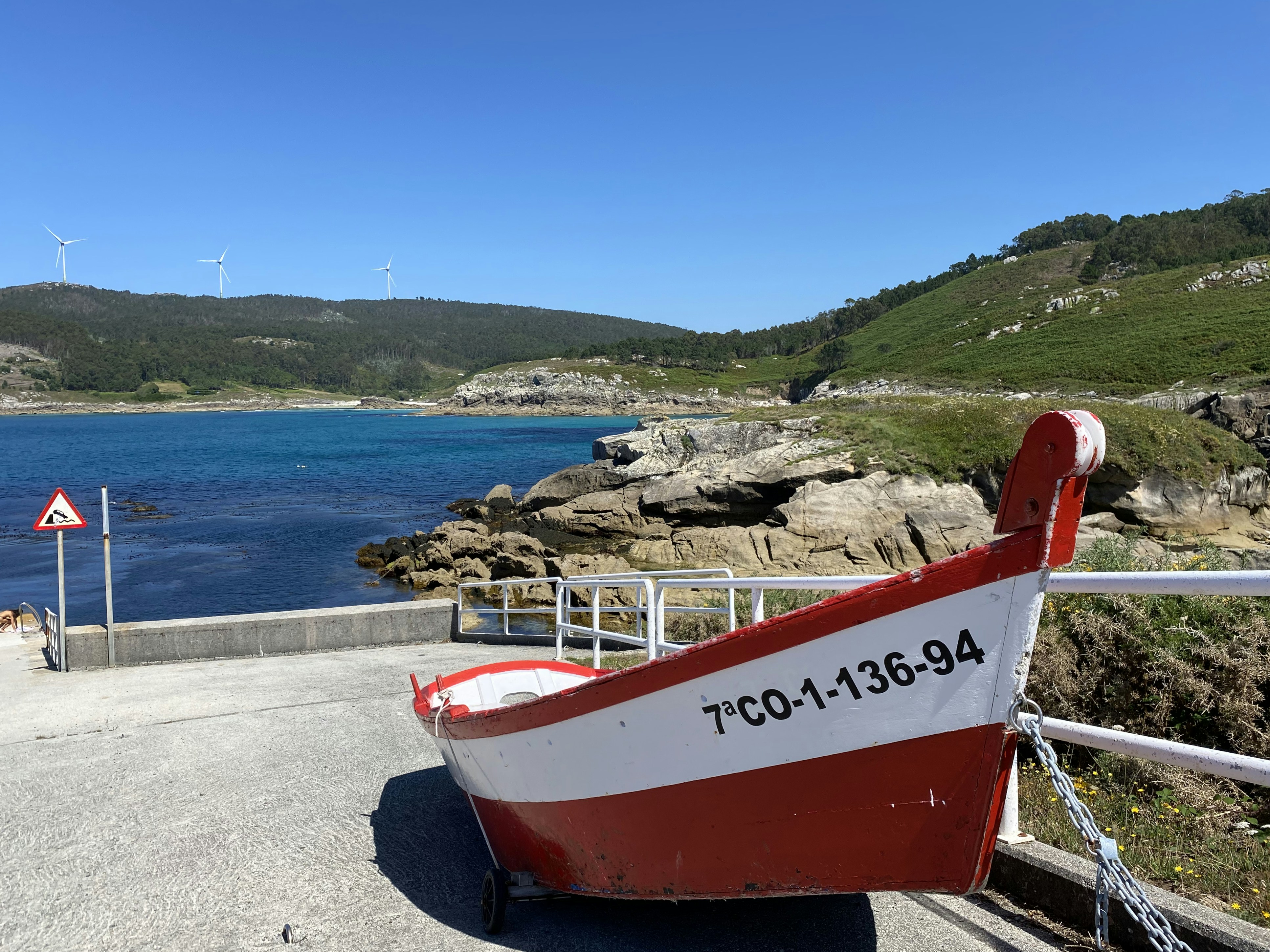 Coastal Serenity: A Beached Vessel's Rest