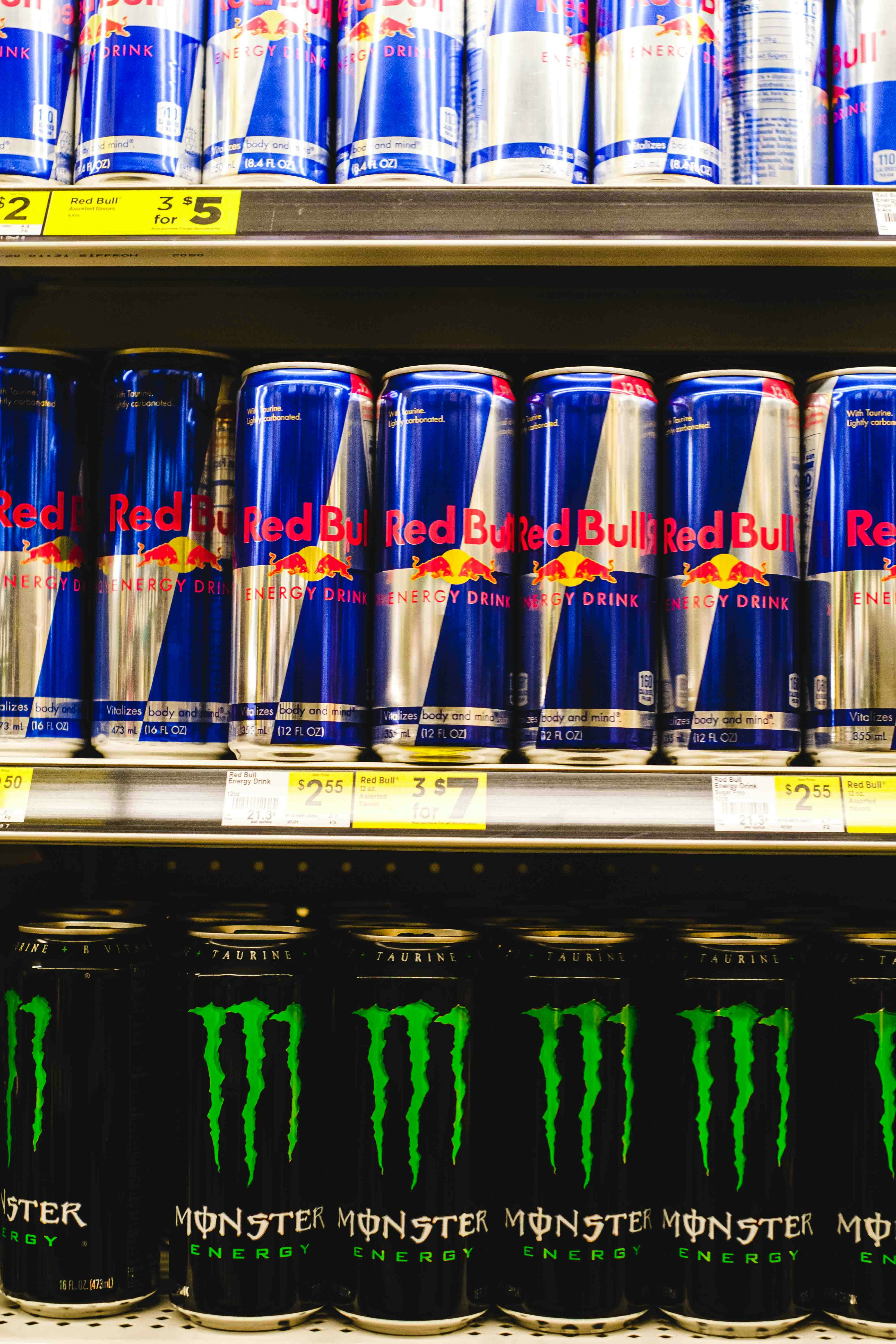 Cans of monster energy drink on a shelf photo – Free Pub Image on Unsplash