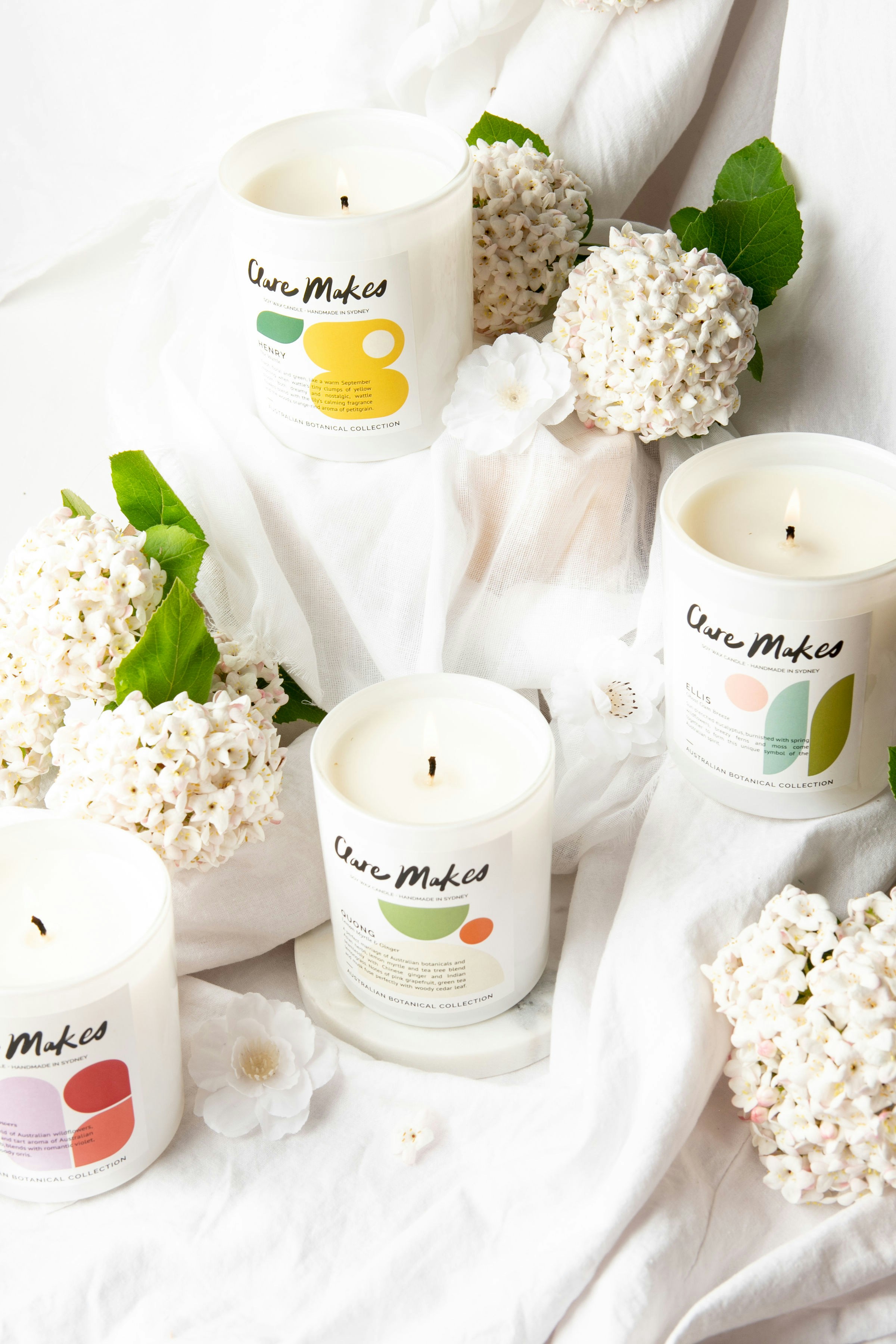 Ivory Candle Patchwork: Quiet Studio Still Life with Hydrangea Clusters