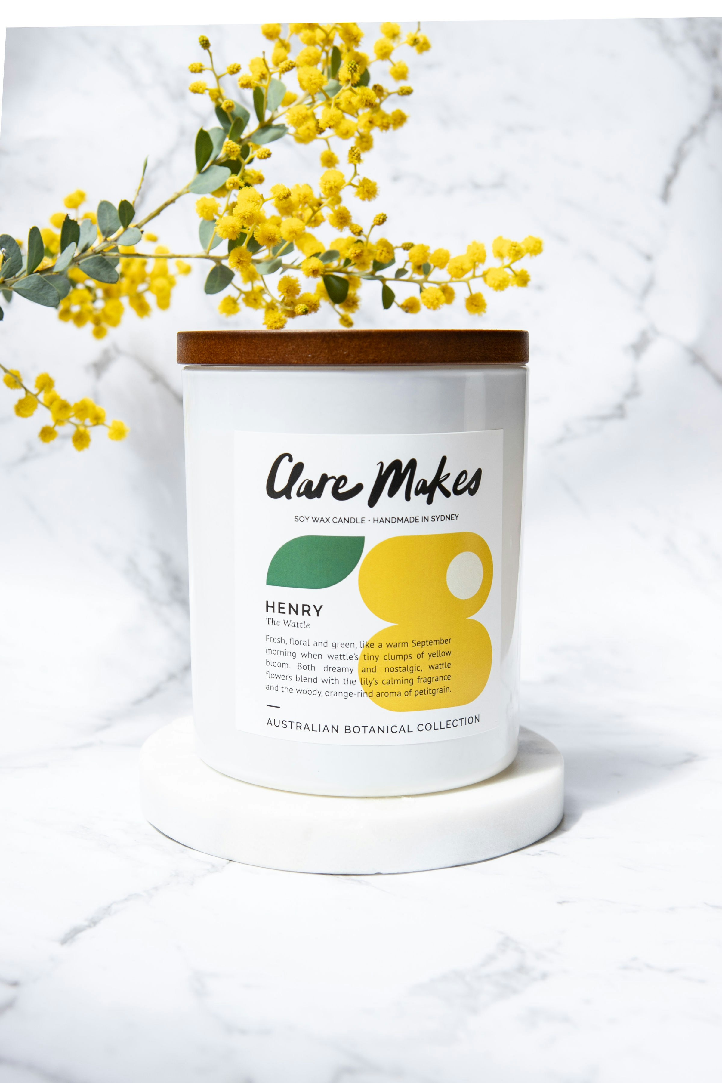 A cup with some yellow flowers in it photo – Free Wattle Image on Unsplash