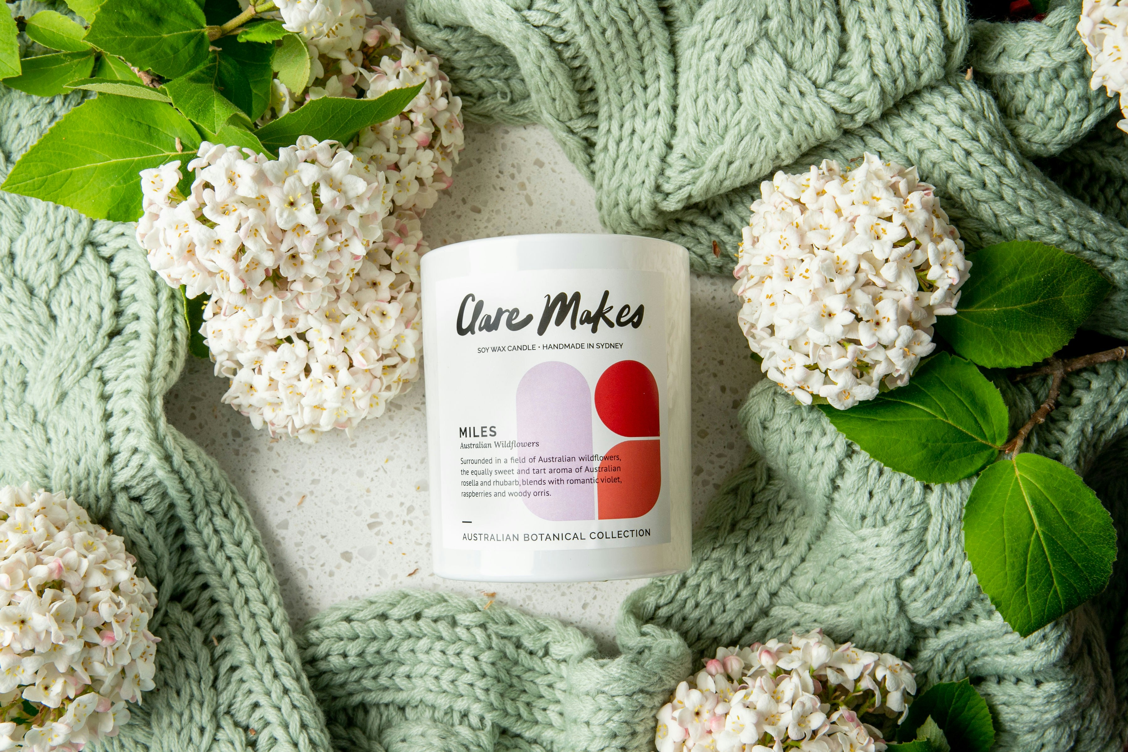 Candle Centered among Soft Knit and Hydrangea Bubbles