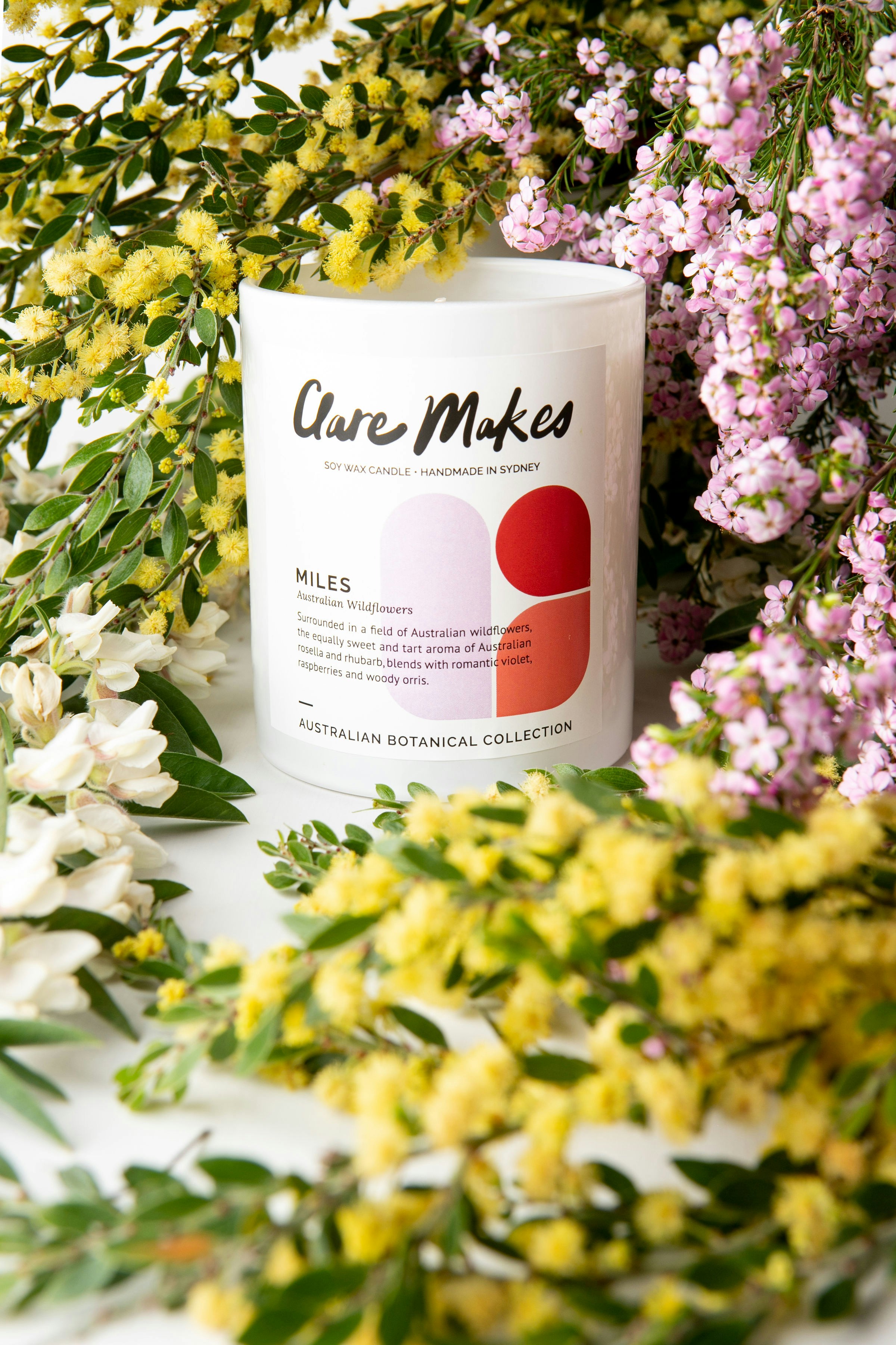 Floral Candle Amid Spring Colors