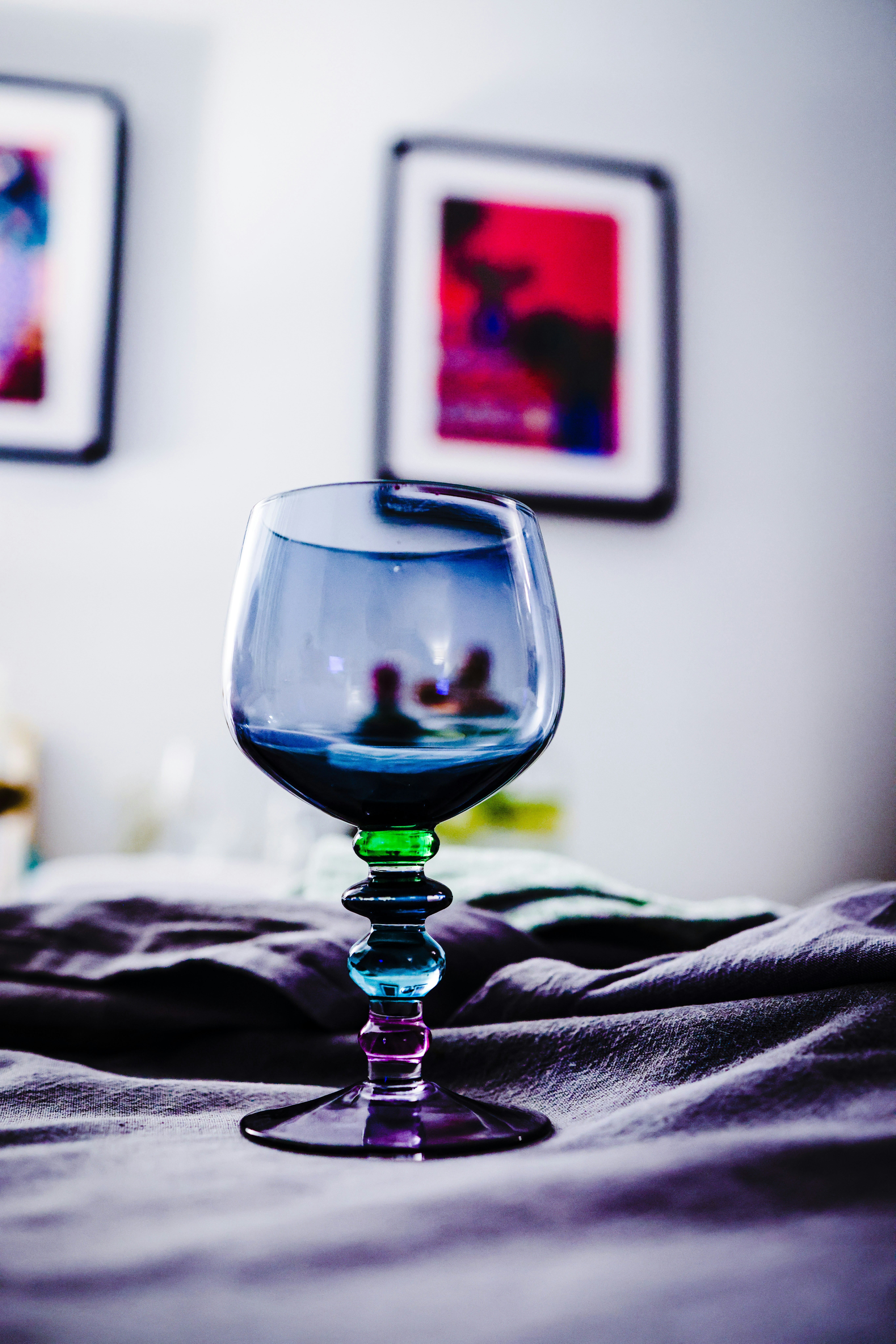 Iridescent Stem Glass on a Velvet Bed: A Quiet Still Life