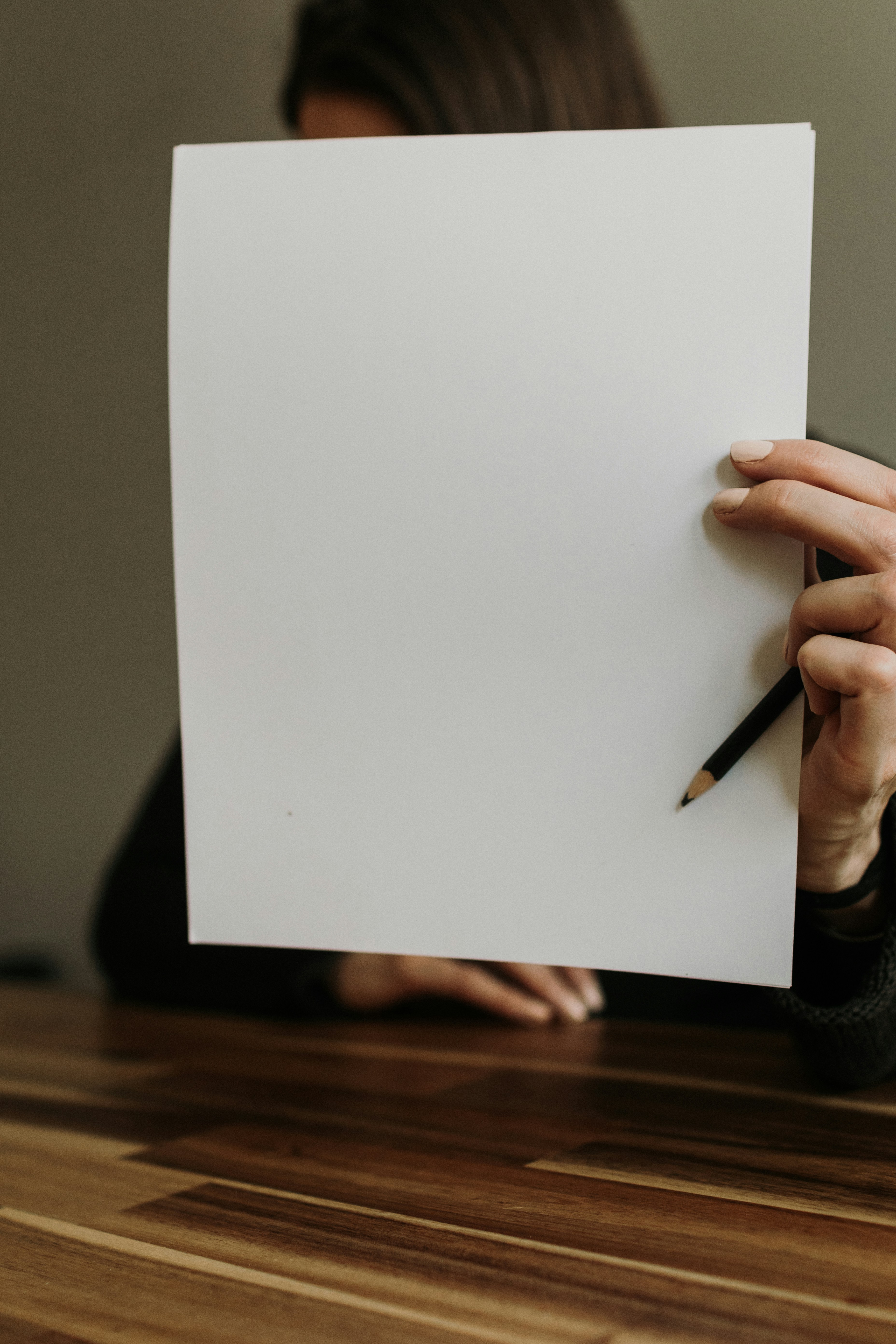 Handing A Piece Of Paper