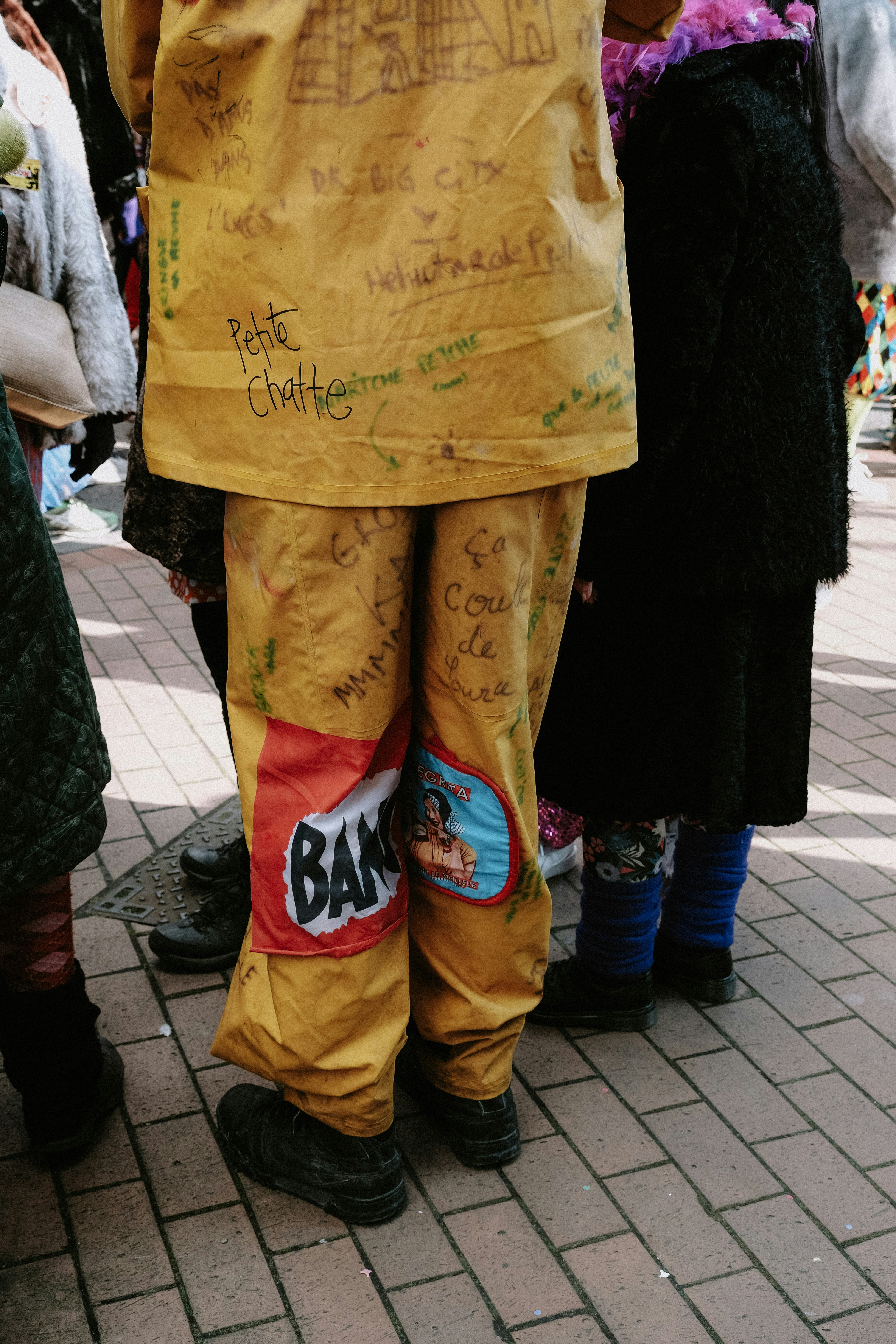 Colorful Suit at a Street Parade: Scribbles and Patches on Yellow Pants