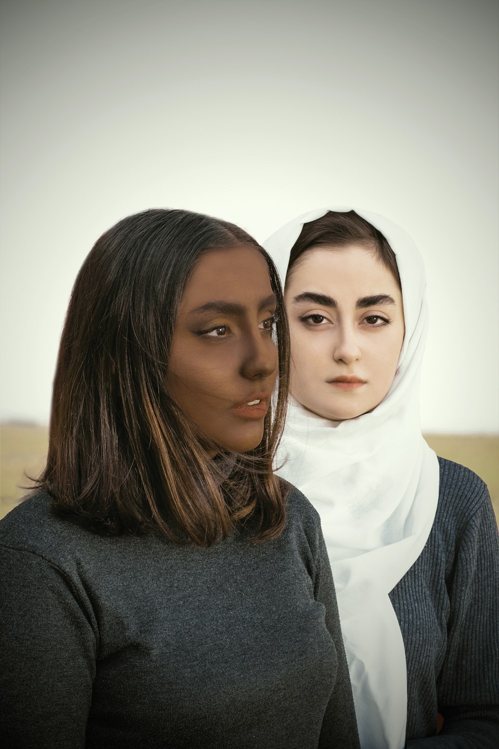 Two women standing next to each other wearing headscarves photo – Free ... Two women standing next to each other wearing headscarves photo – Free ...