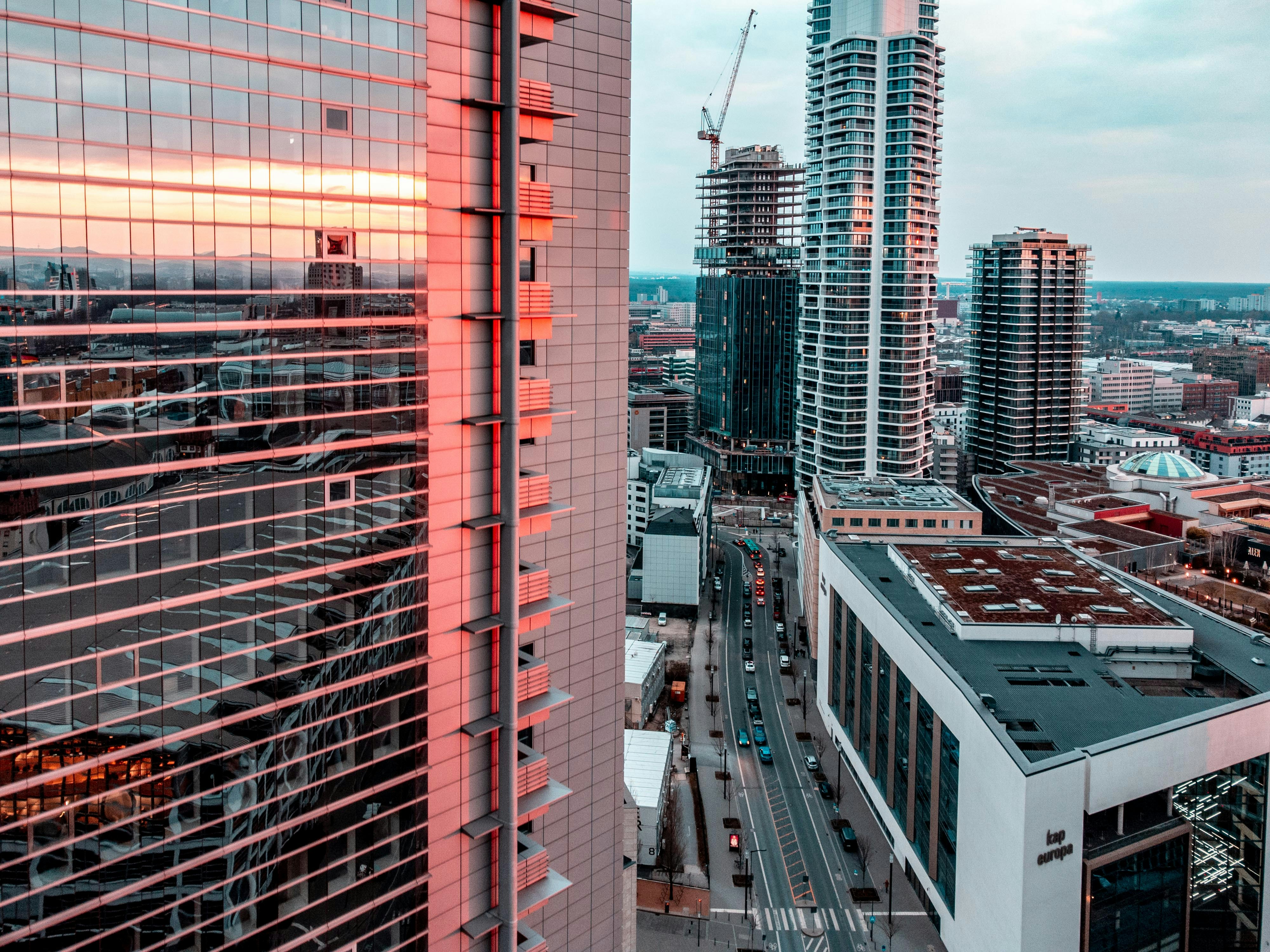 A view of a city from a high rise building photo – Free High rise Image ...