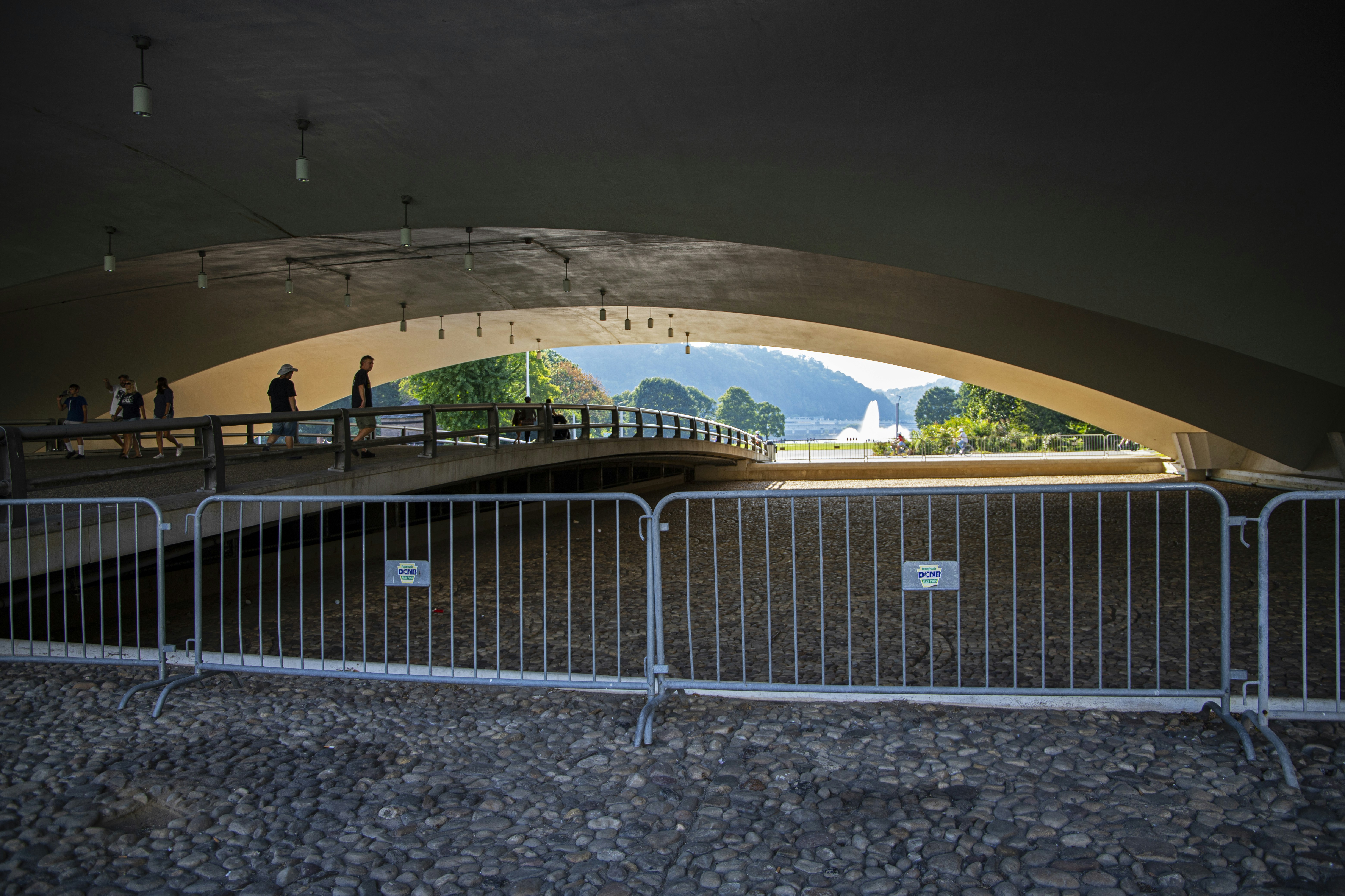 Pedestrian Bridge Underpass Framing Over a Cobble Arch