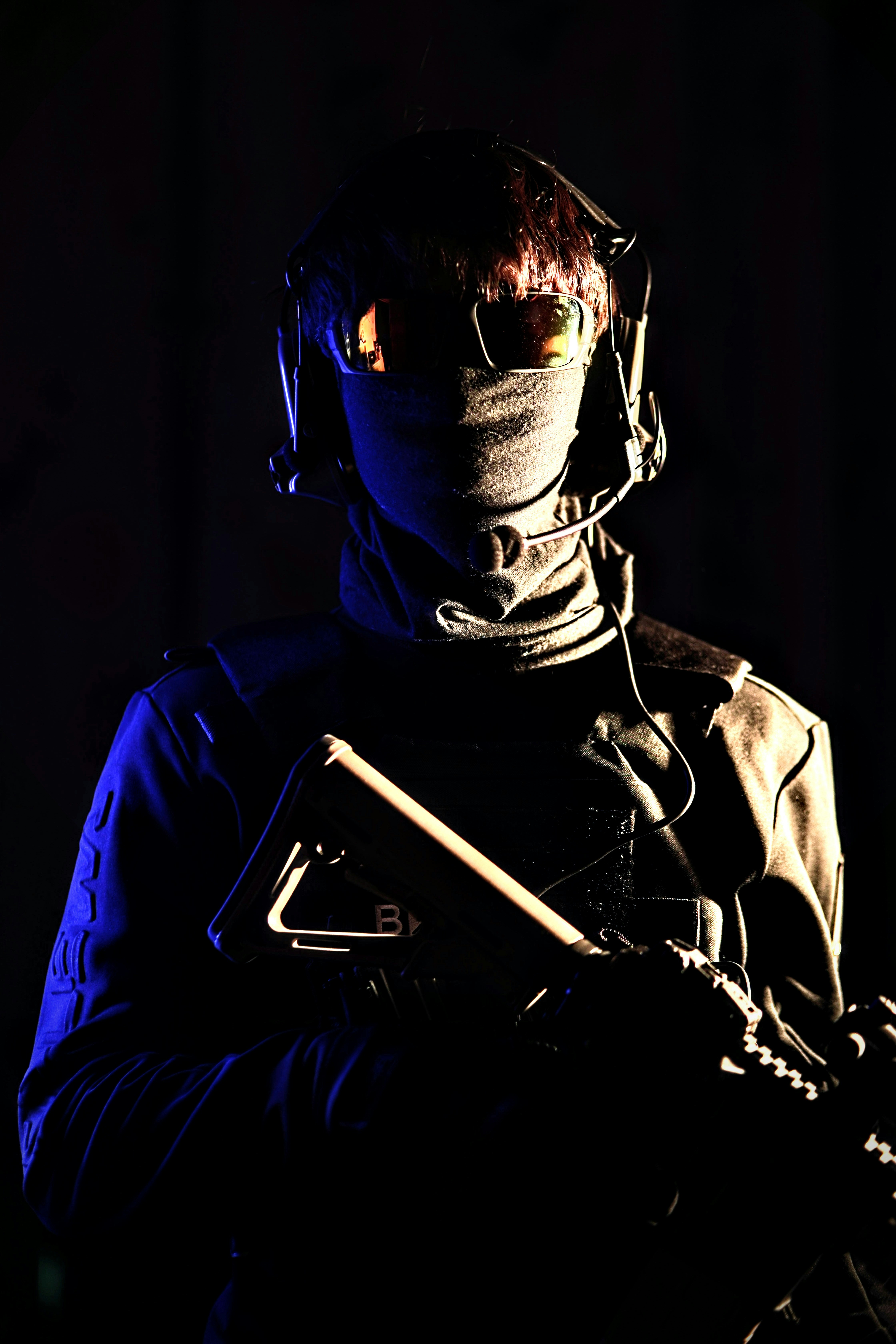 Blue Rim Sentinel: A Tac Operator Poised in Shadow