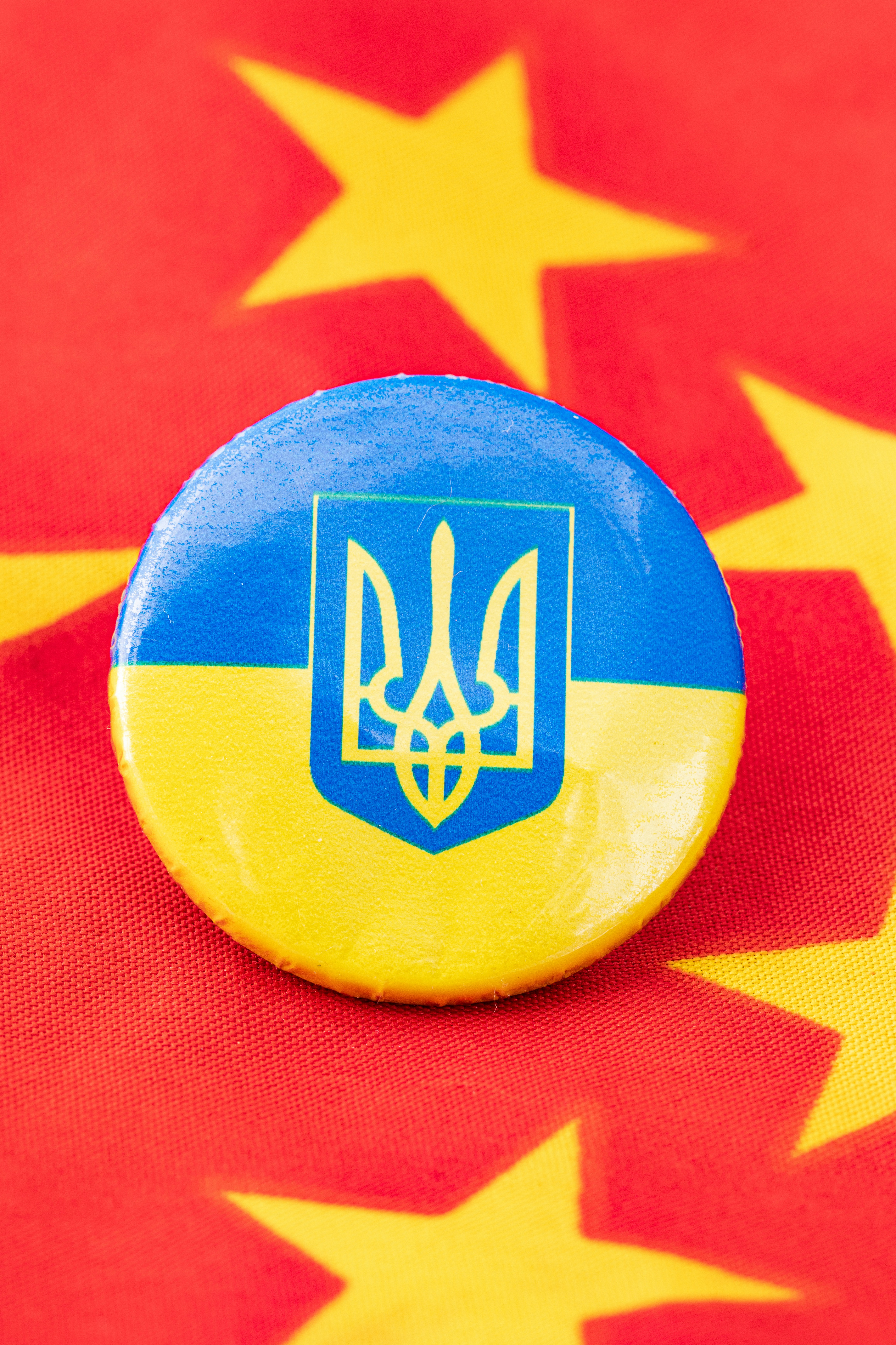 Trident Emblem on a Starry Flag: A Close-Up of Ukrainian Identity