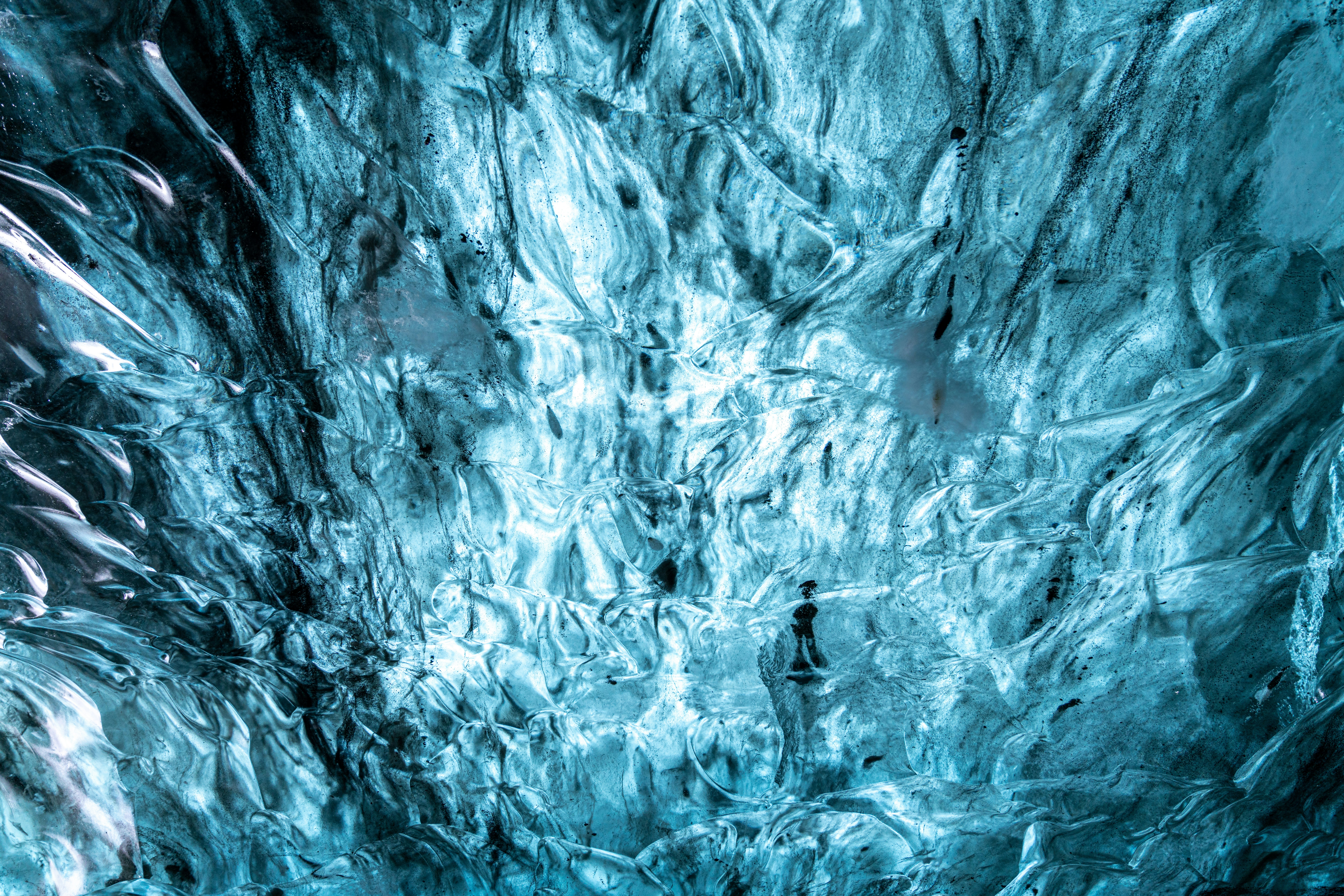 A very large ice cave filled with lots of ice photo – Free Blue Image ...