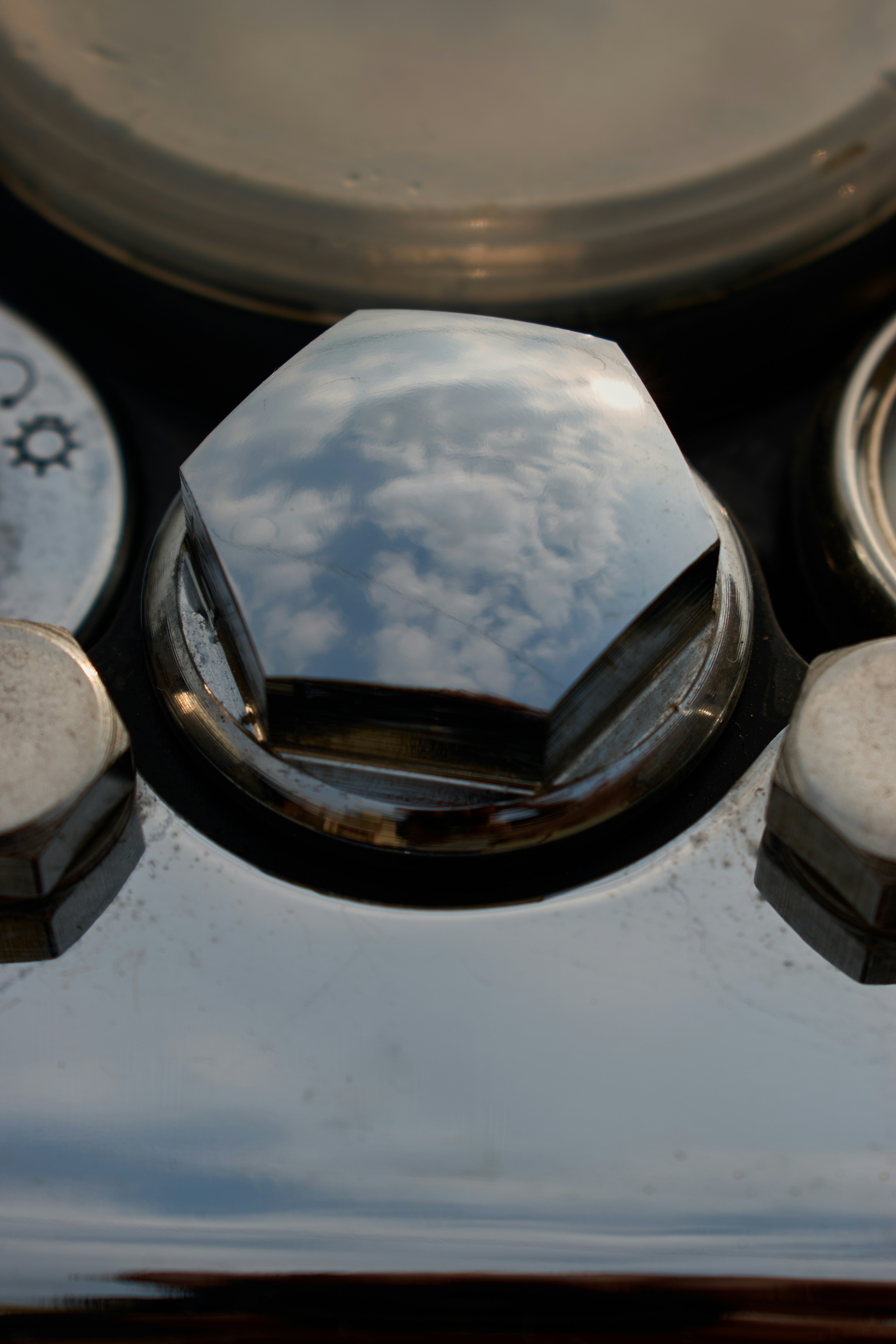 Chrome Hex Cap Reflecting a Skyscape