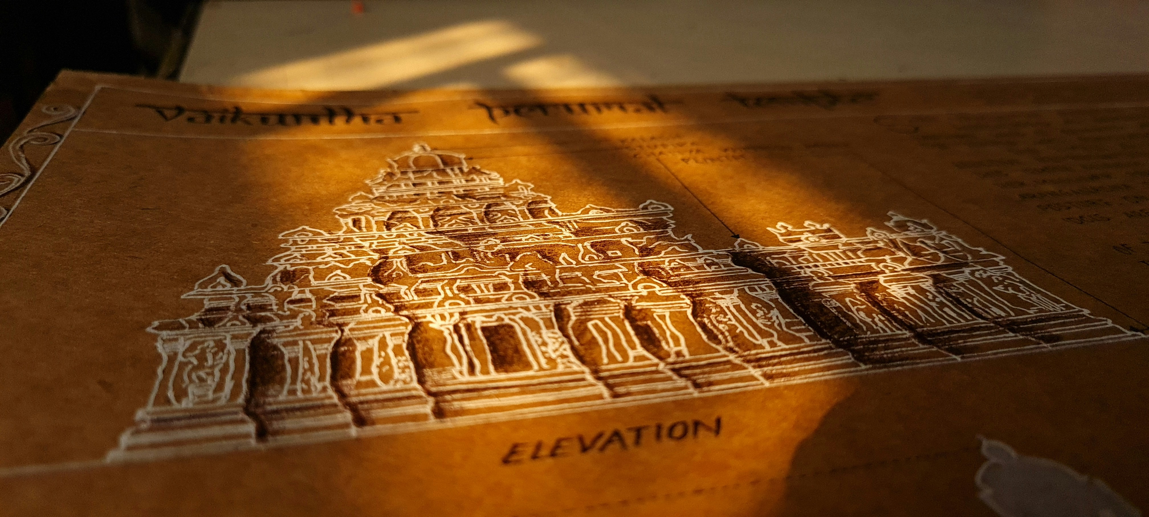 a drawing of a building on a piece of paper