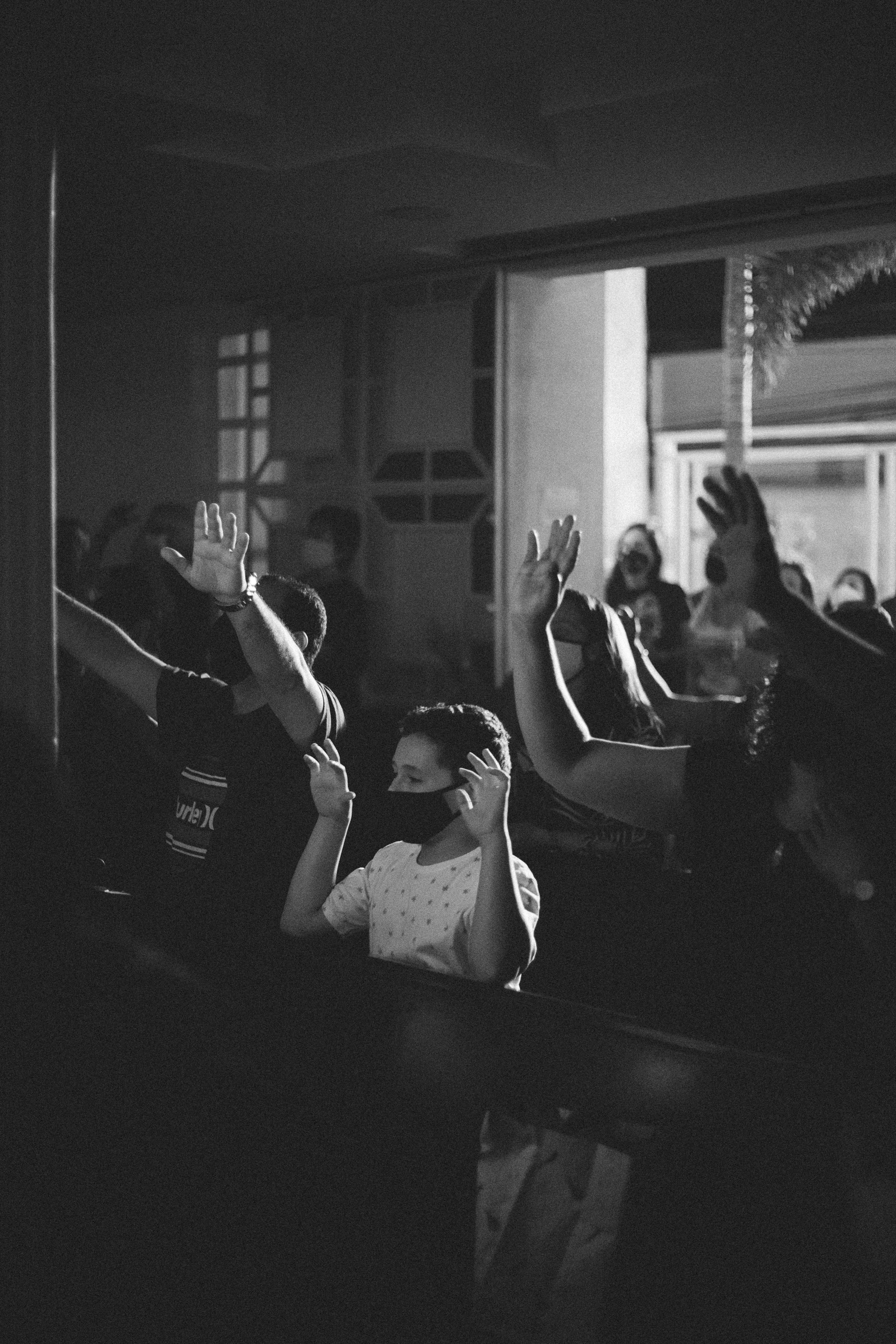 A black and white photo of people clapping photo – Free Grey Image on ...