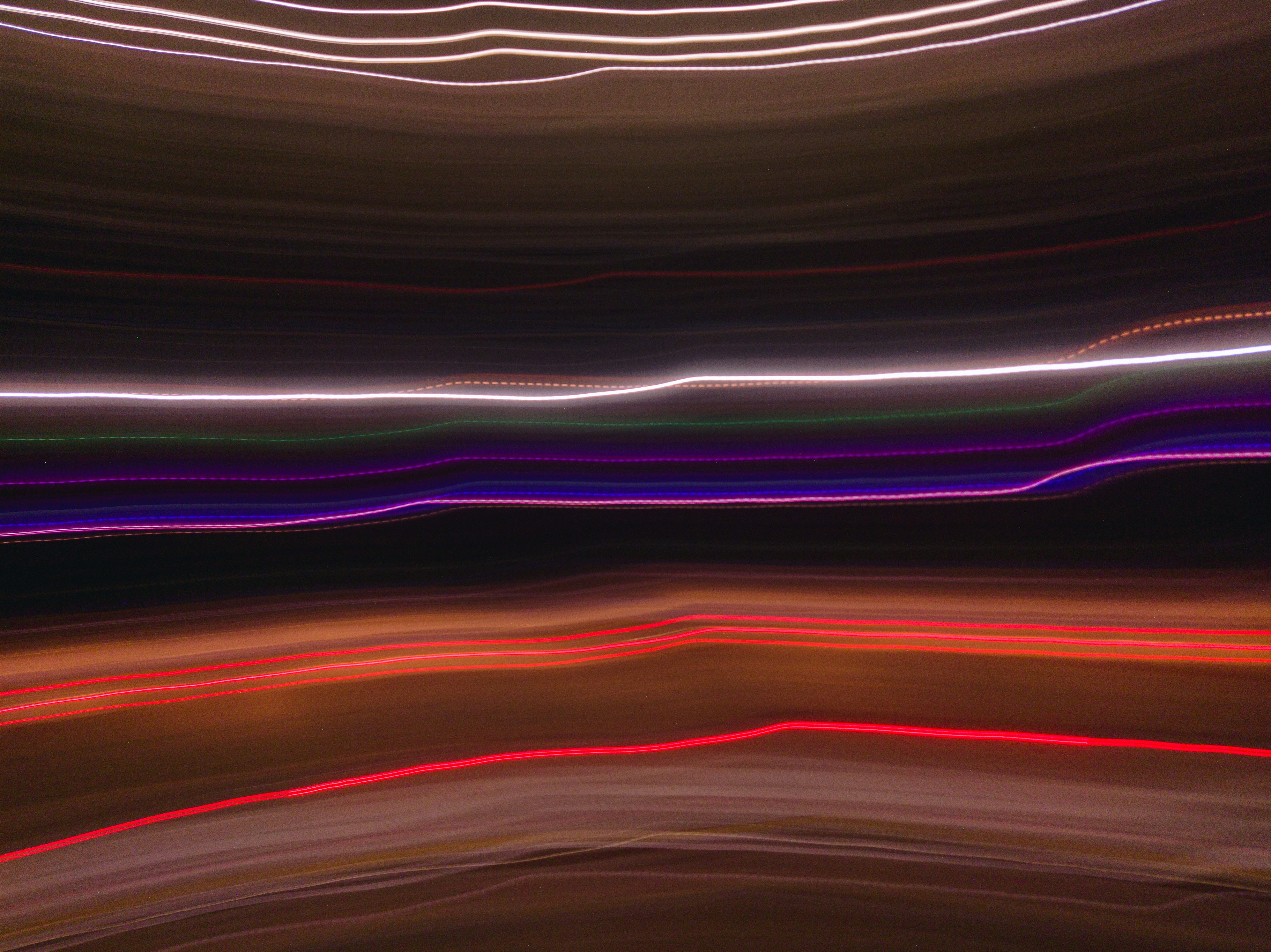 Horizontal Neons: A Pulse of Night Lights in Motion