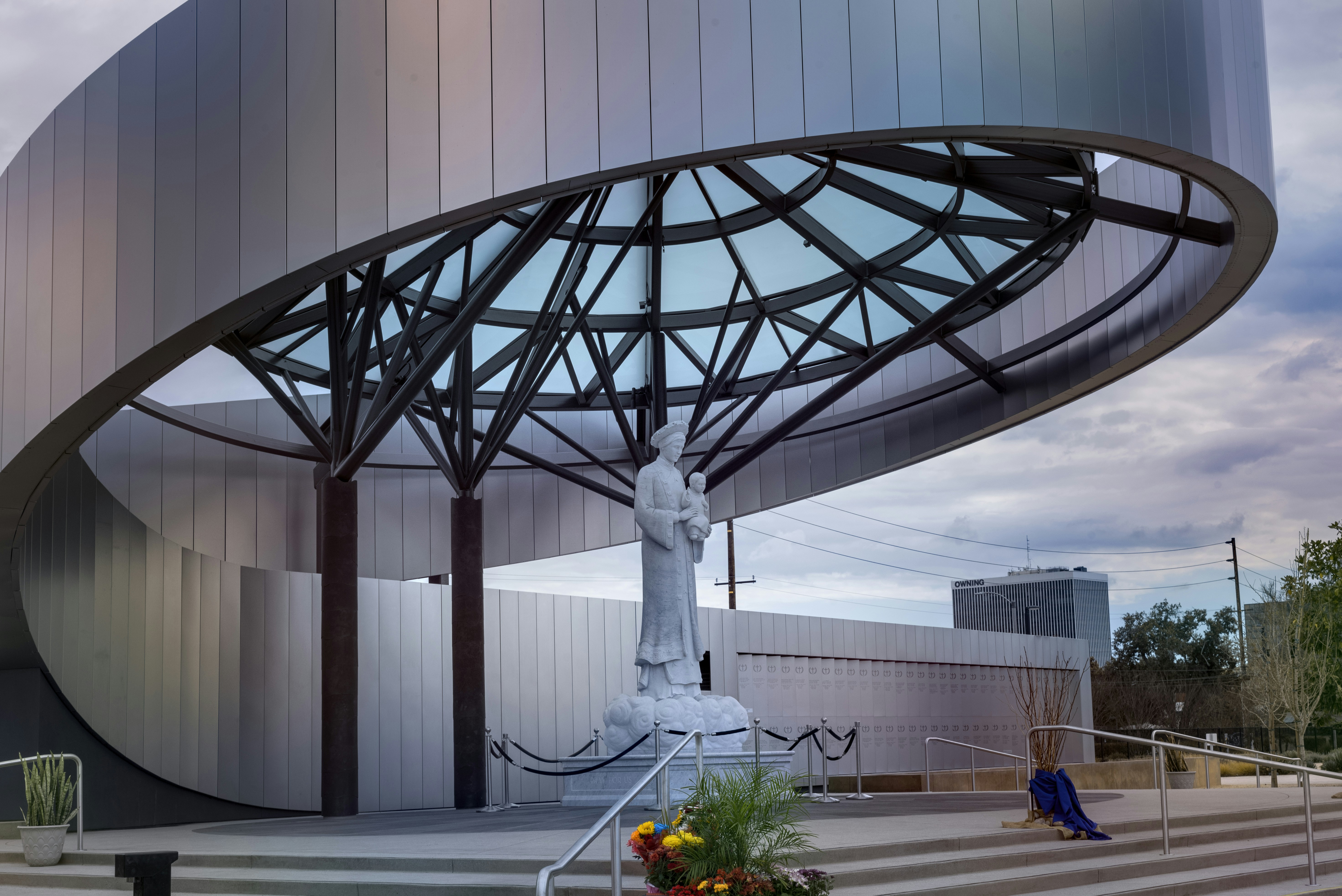 A large metal structure with a statue on top of it photo – Free Faith ...