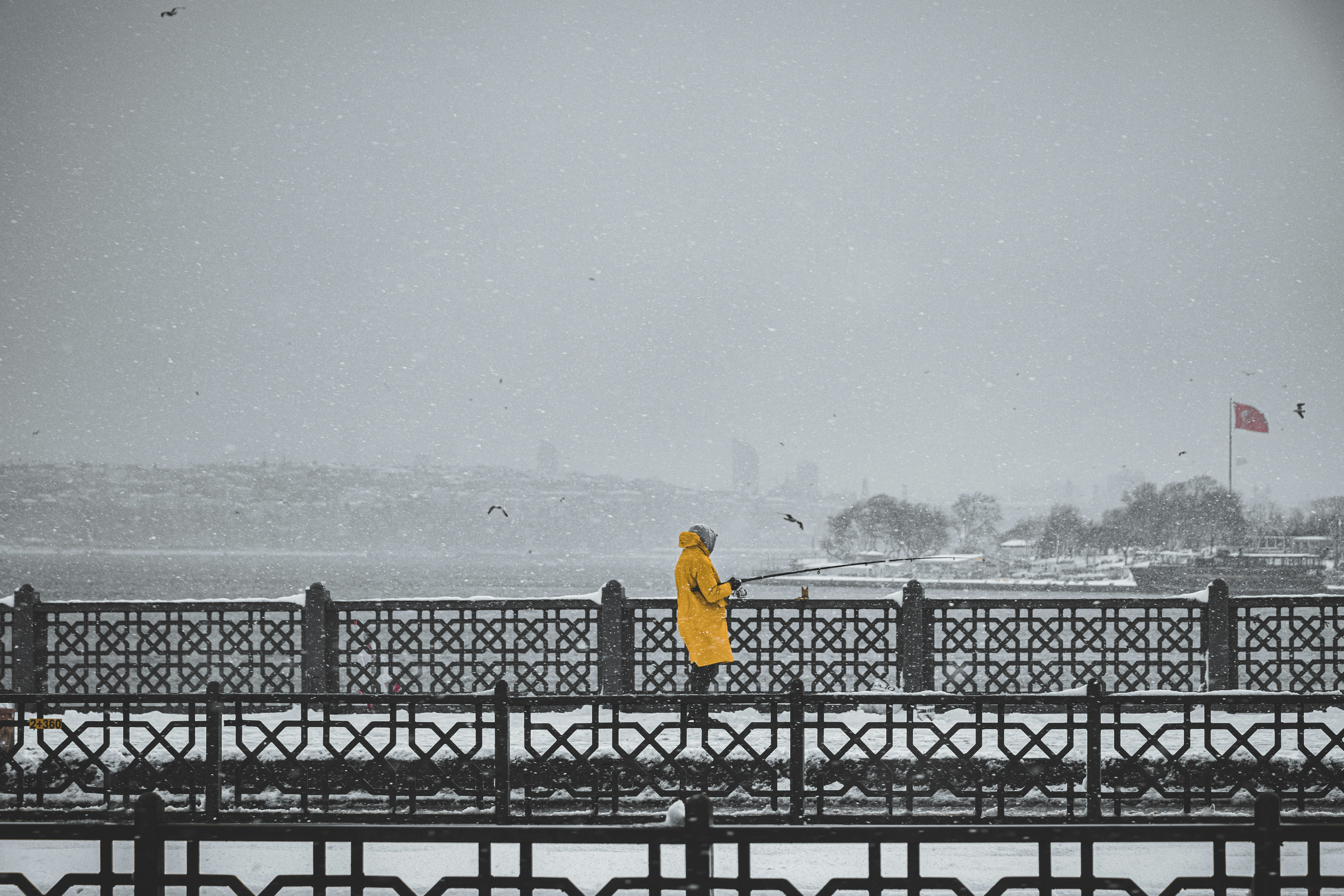Yellow Beacon on a Snowbound Riverfront