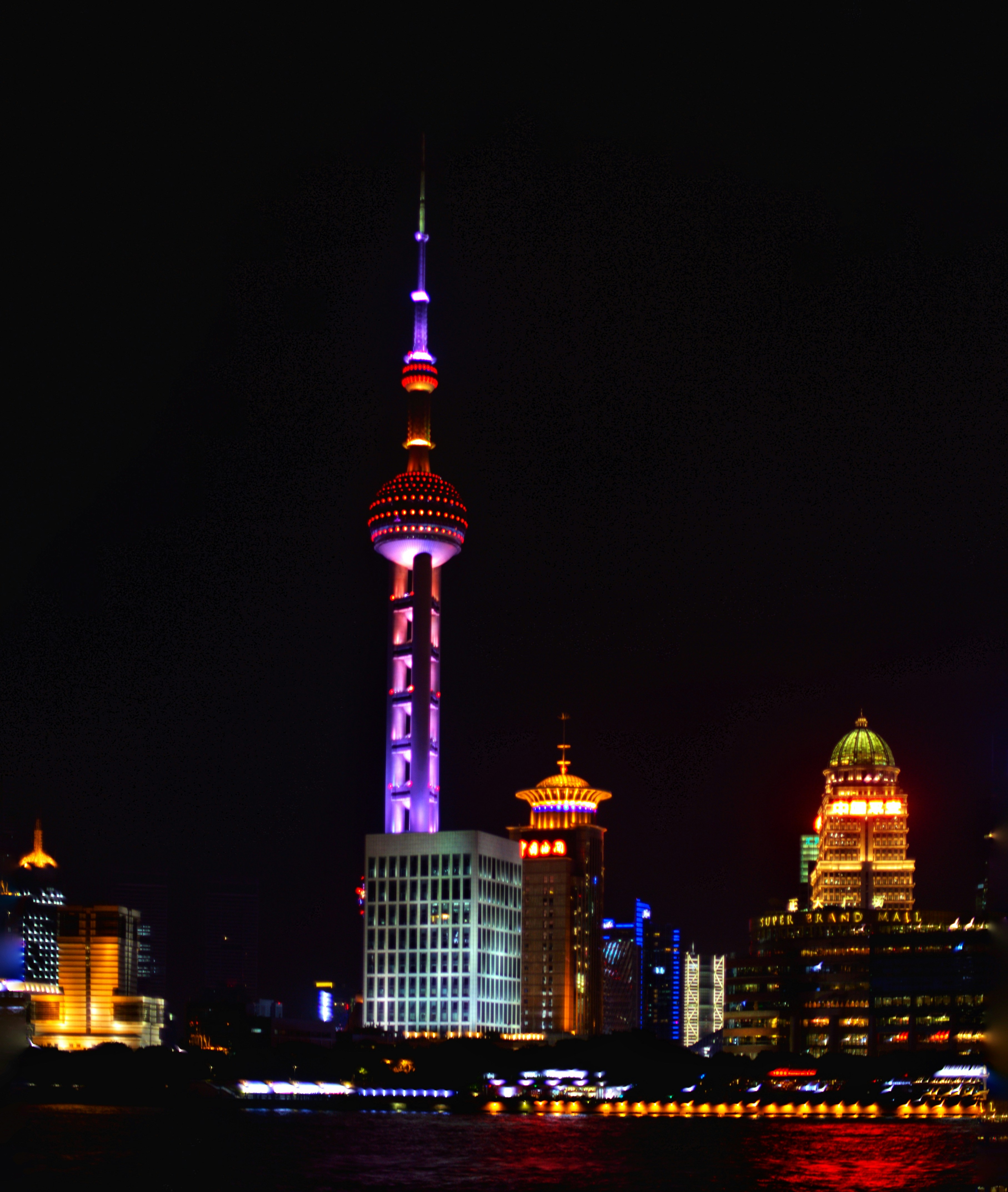 Luminous Spire over the Bund: Shanghai Nightscape
