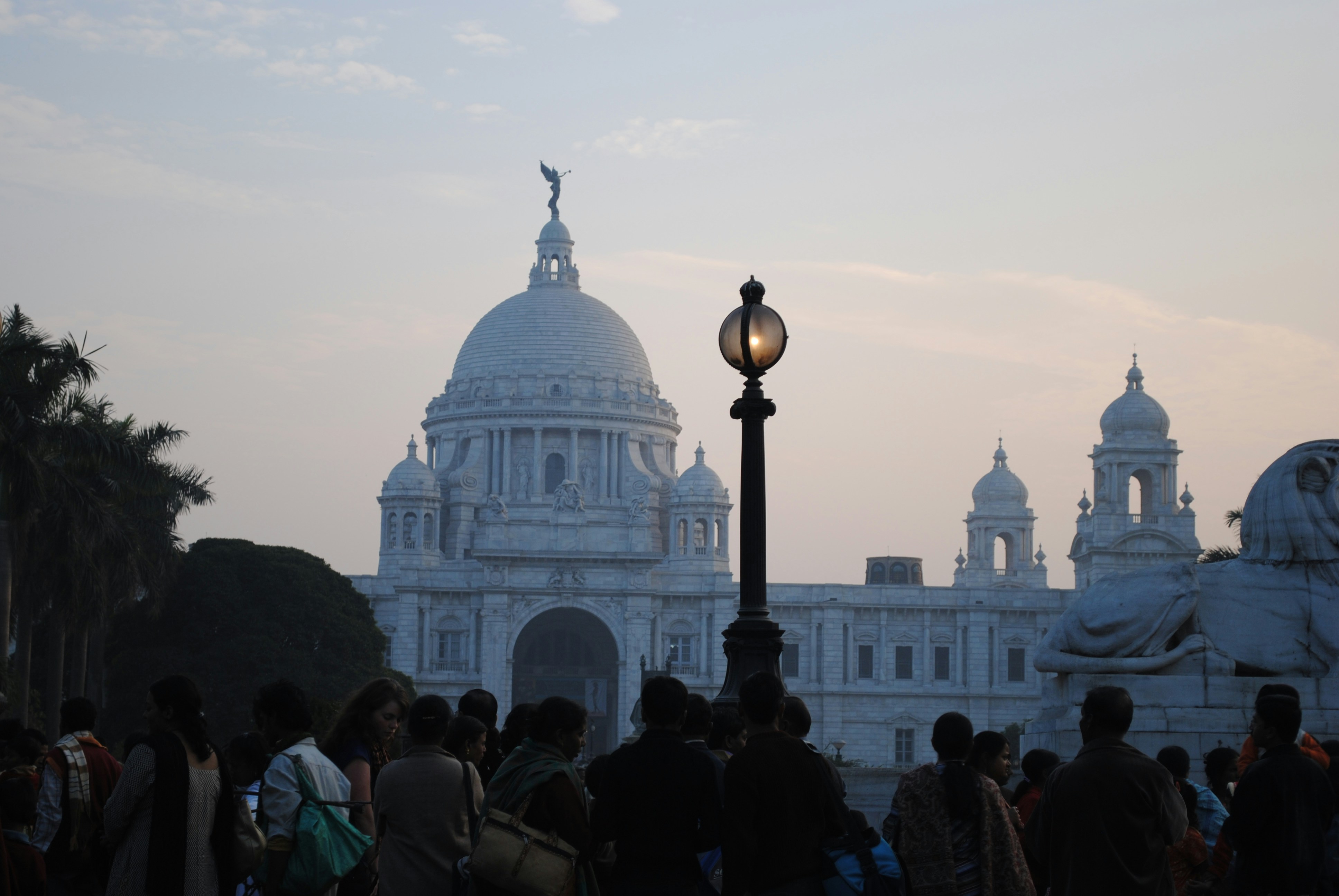 Dome of Marble and Lanterns: People Gather Before Victoria Memorial