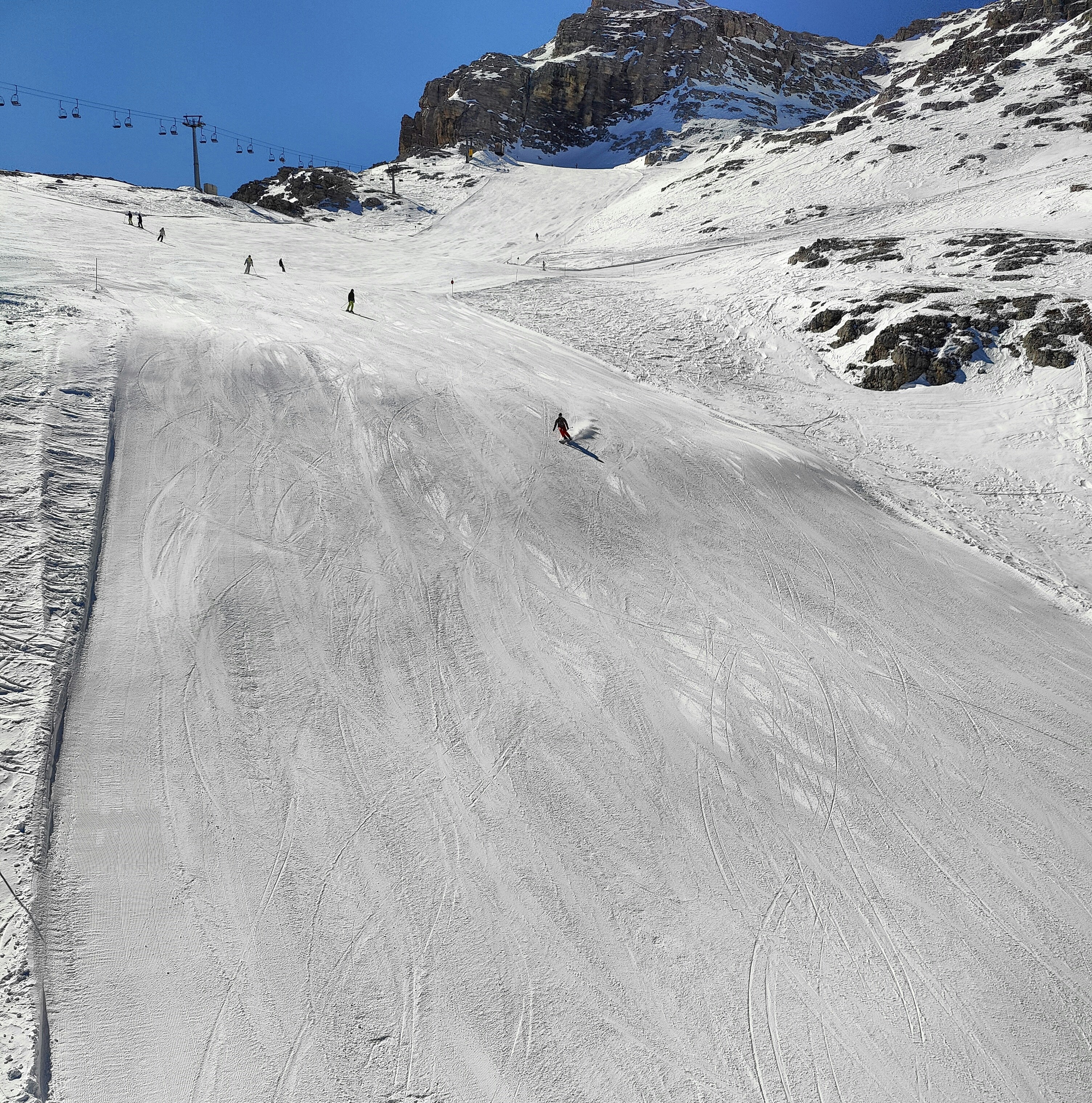 Gulls of Snow: A Lone Skier Descends the Gentle Bend