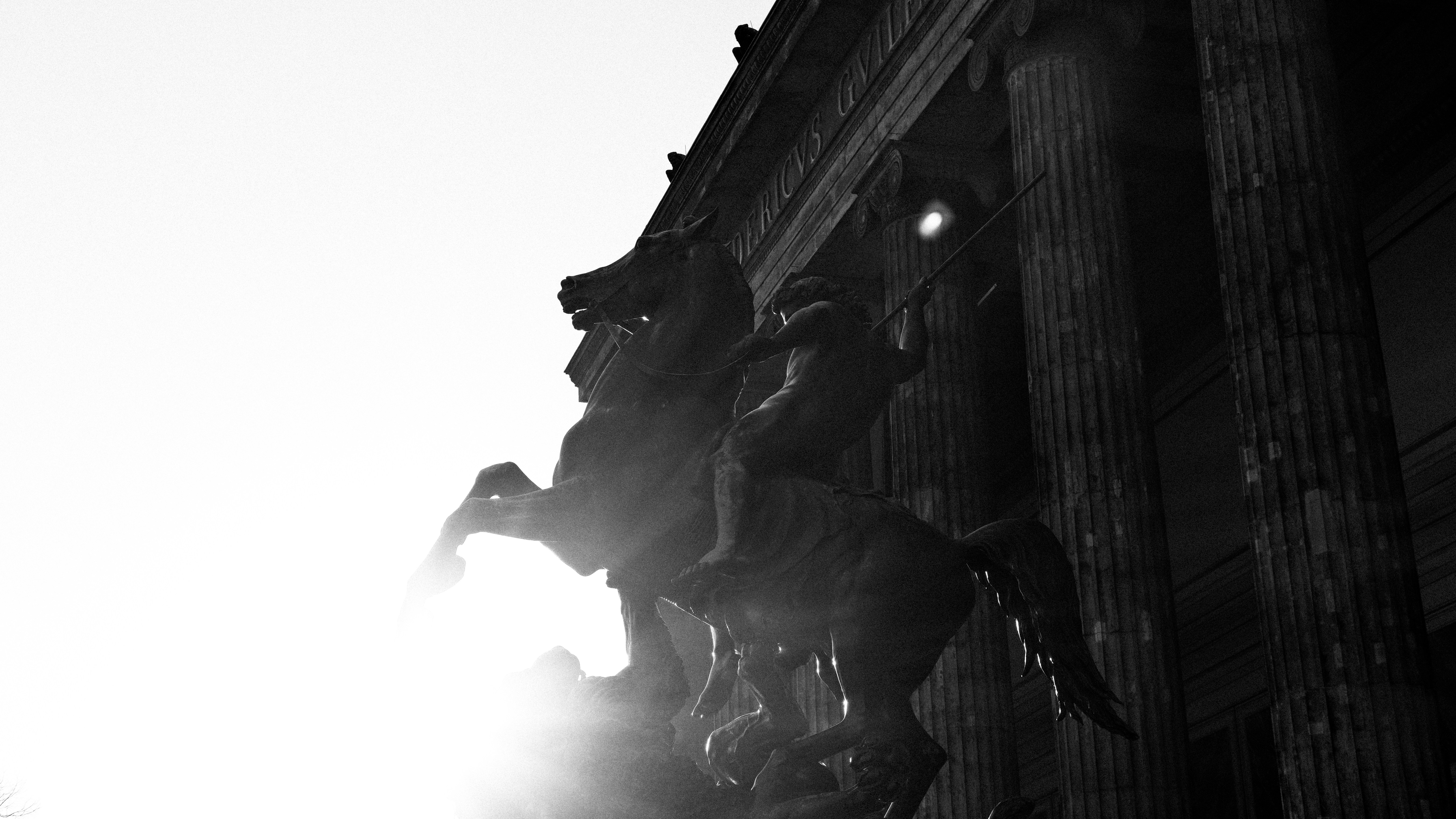 Monumental Bronze Carving Under Blinding Sun